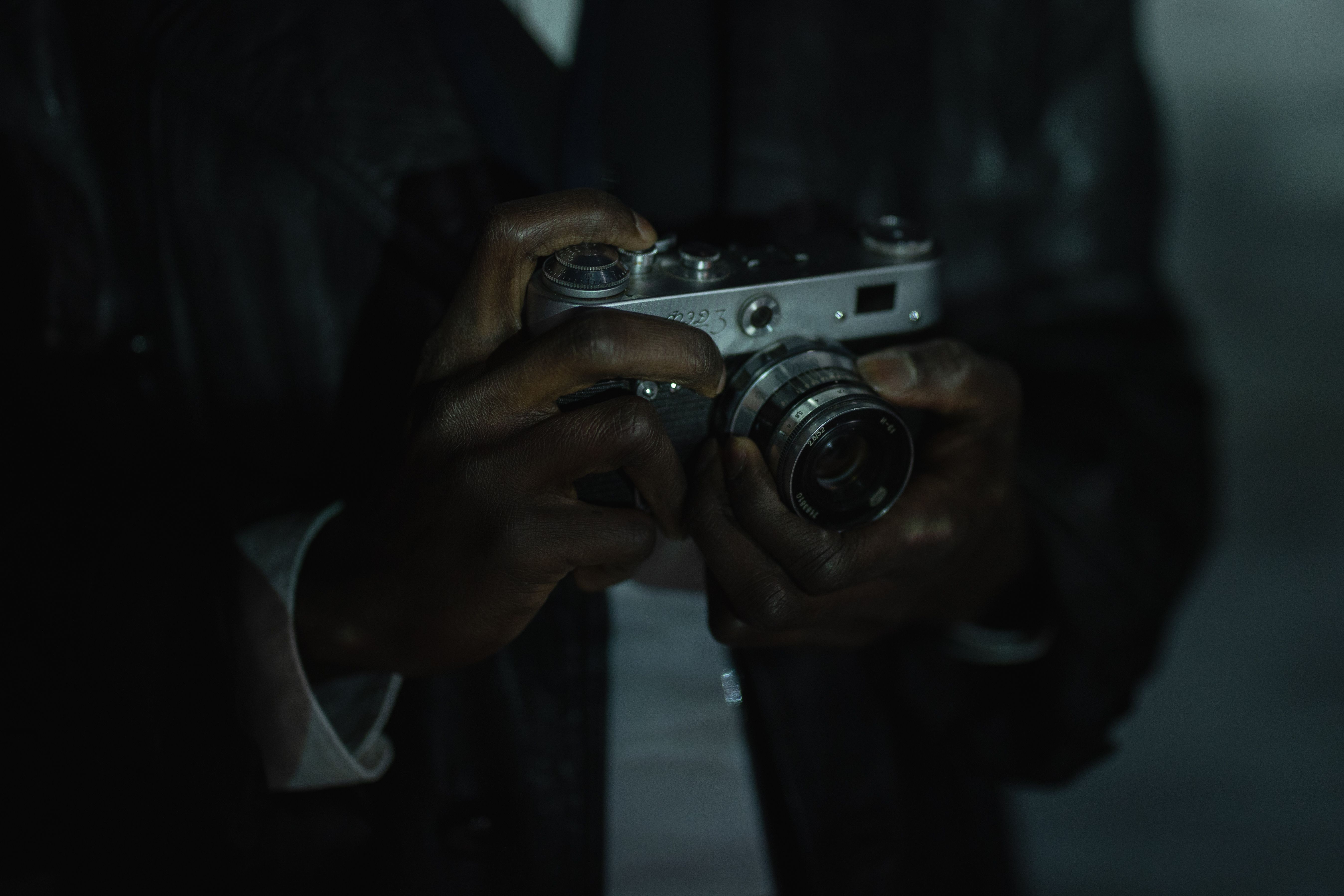 Close up of Hands Holding Vintage Film Camera · Free Stock Photo