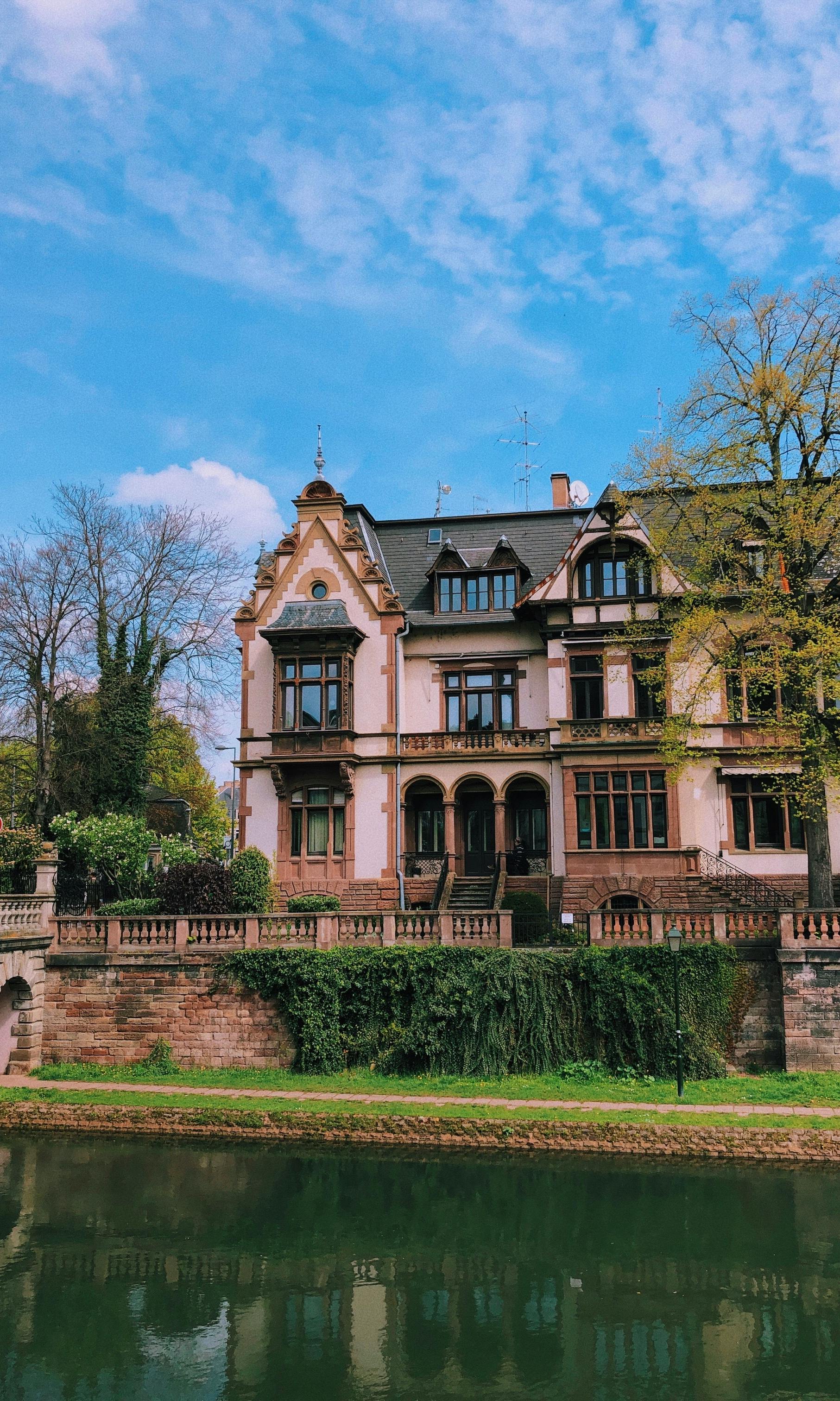 Traditional Mansion Among Trees · Free Stock Photo