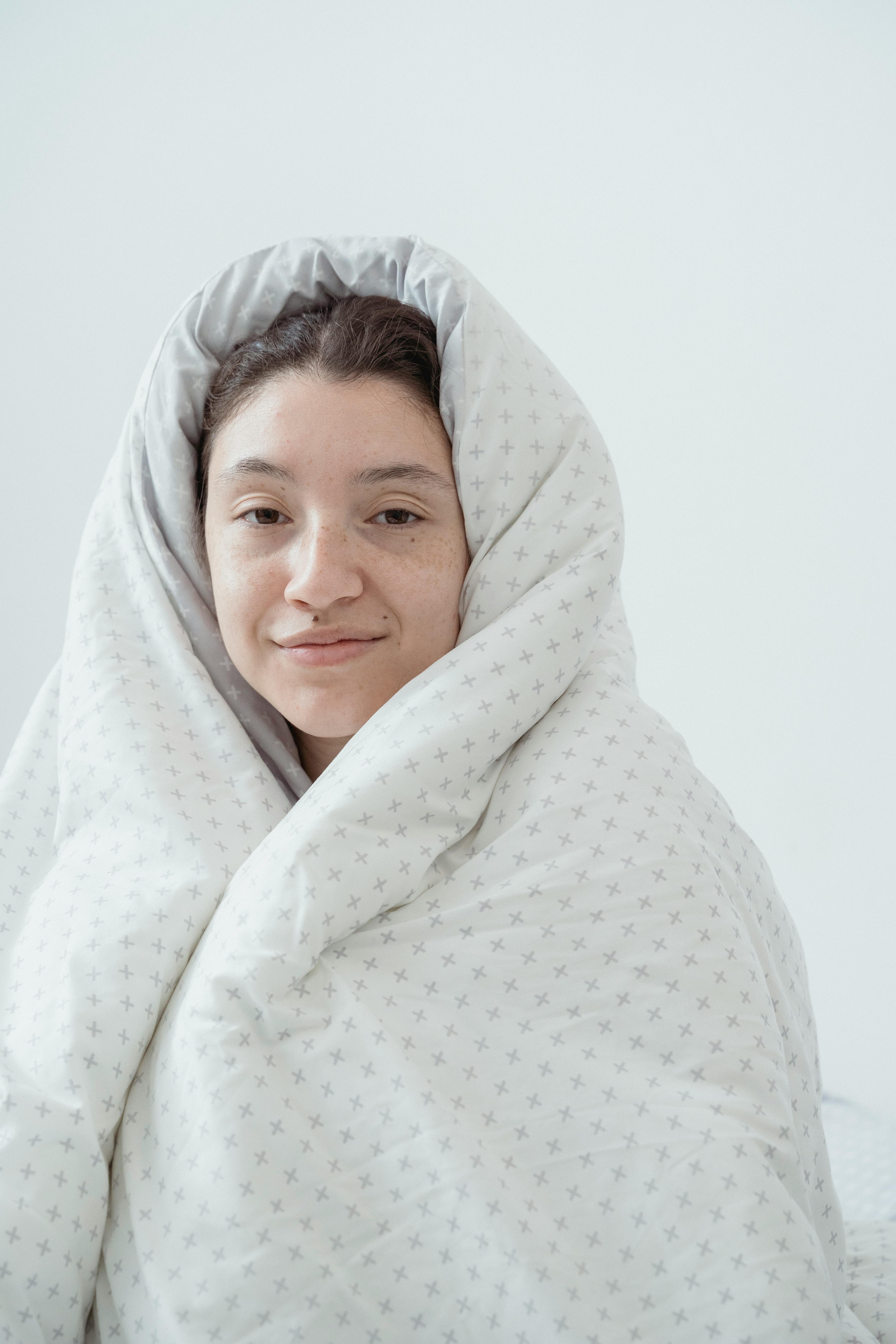 Portrait of Woman Wrapped in Blanket · Free Stock Photo