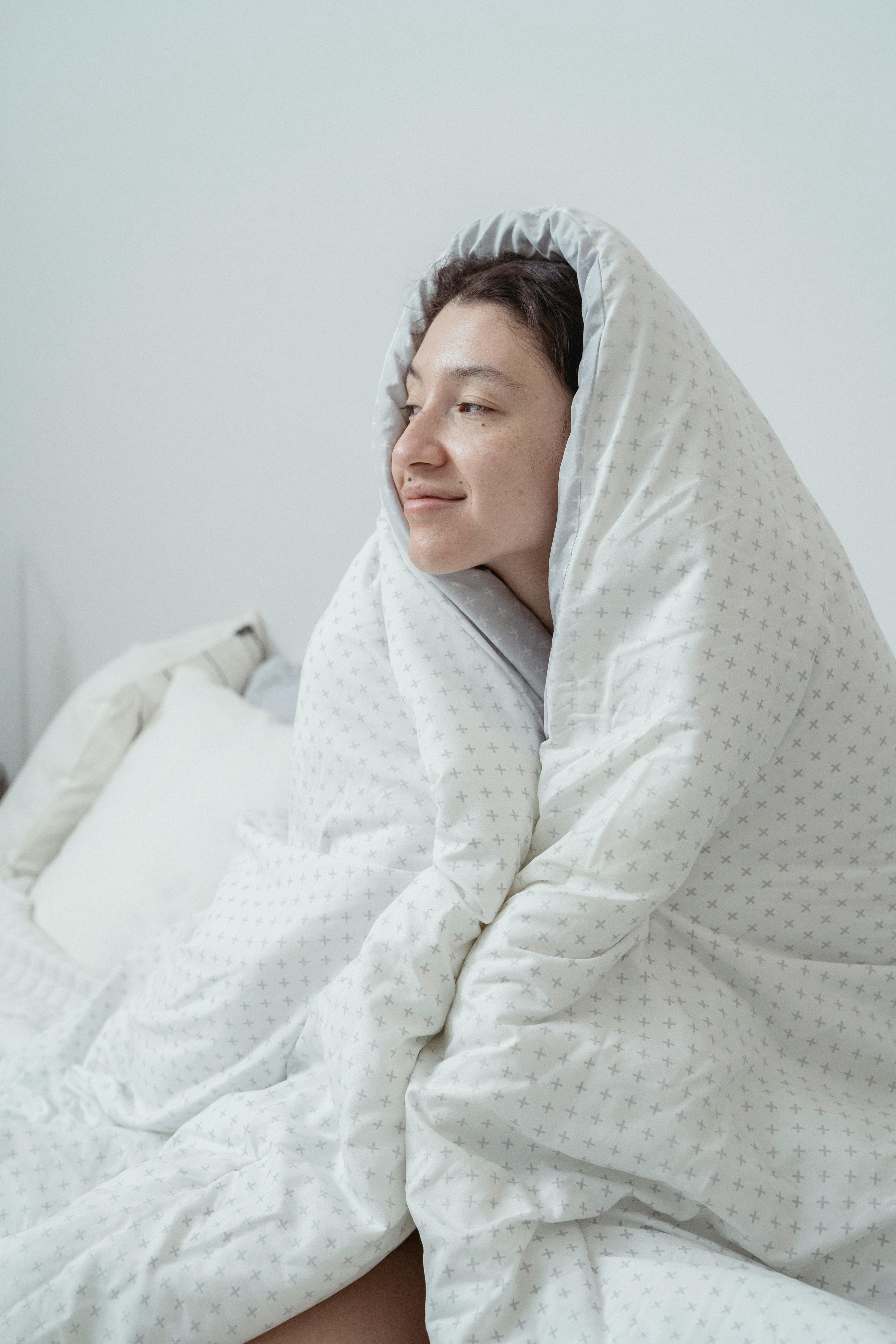 A Woman Covering with Blanket · Free Stock Photo