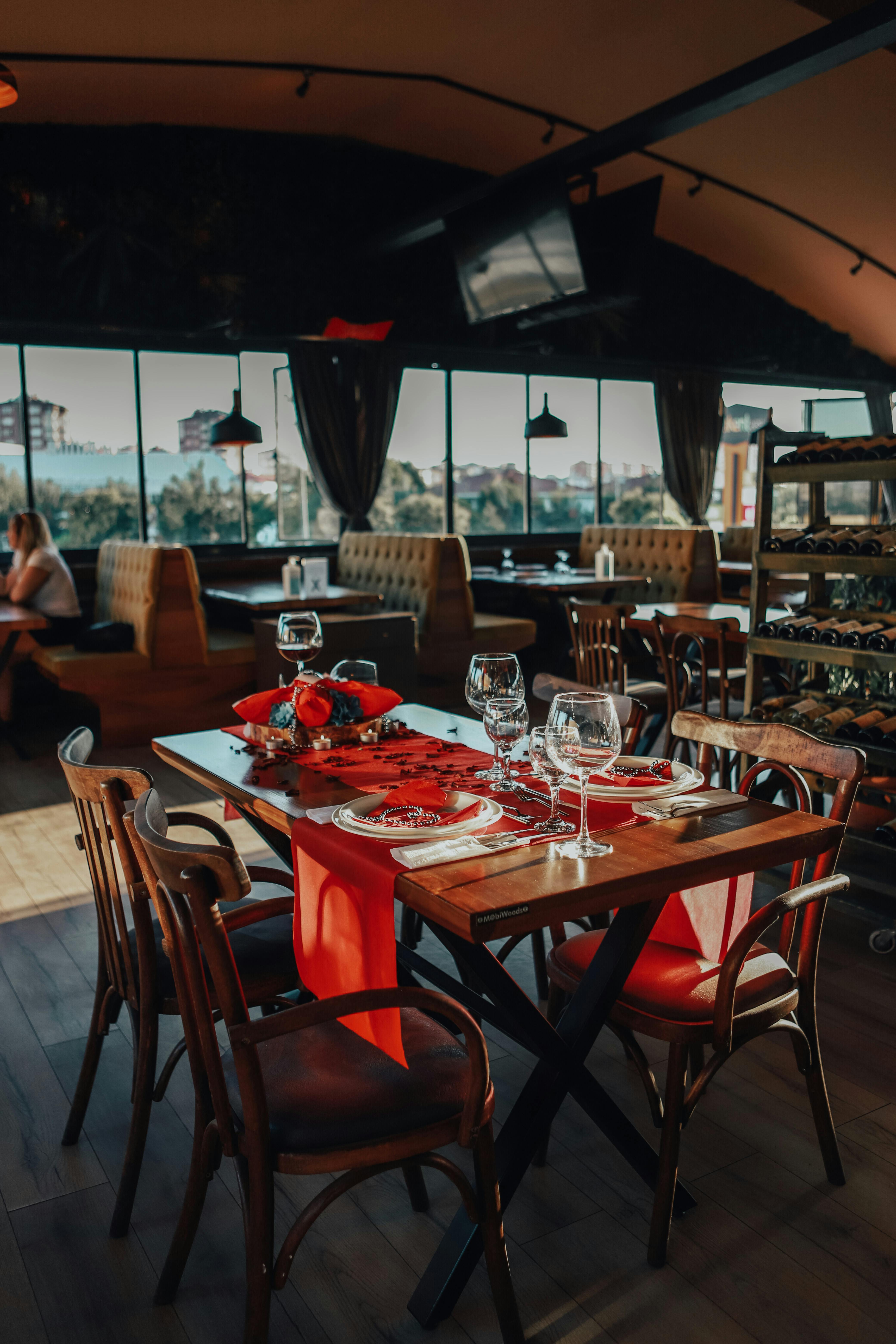 Wooden Dining Table and Chairs in a Restaurant · Free Stock Photo