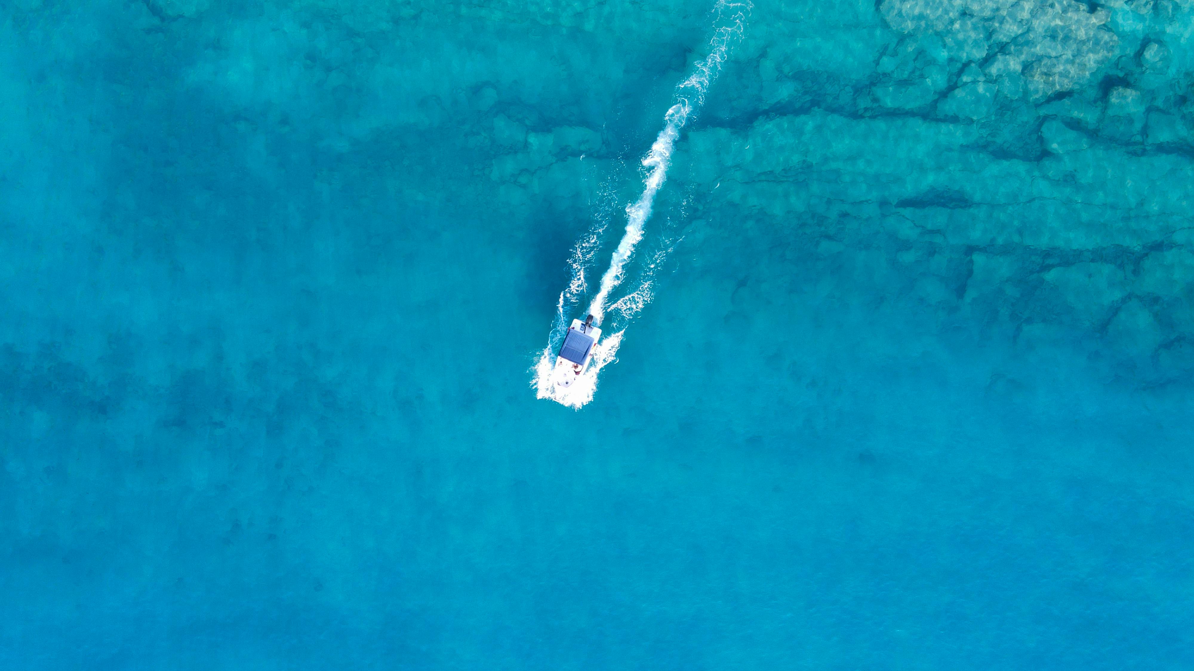 A Motor Boat Traversing the Sea · Free Stock Photo