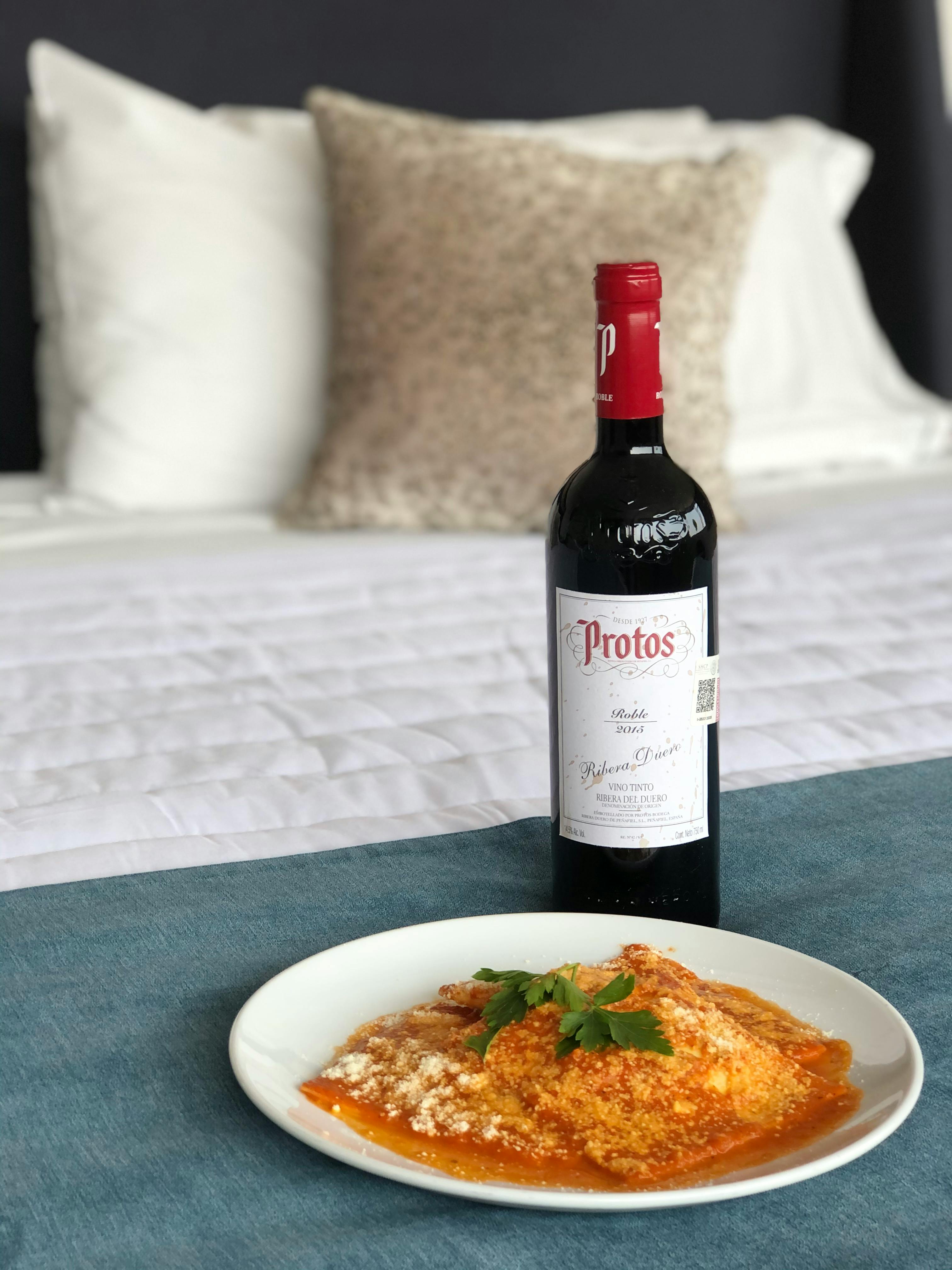 A Lady Having a Sumptuous Dinner · Free Stock Photo