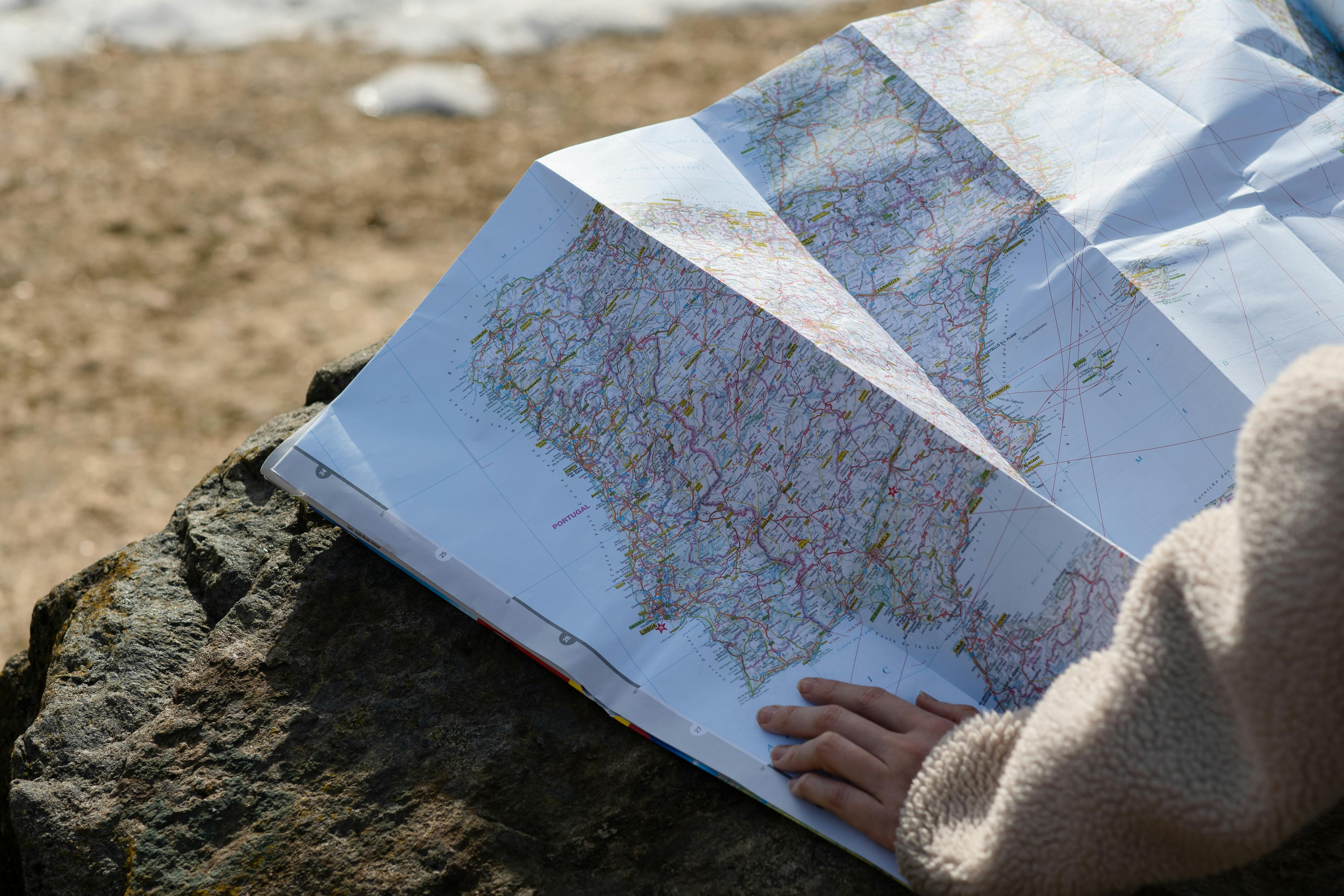 A Wall Clock with a Colorful World Map Design · Free Stock Photo