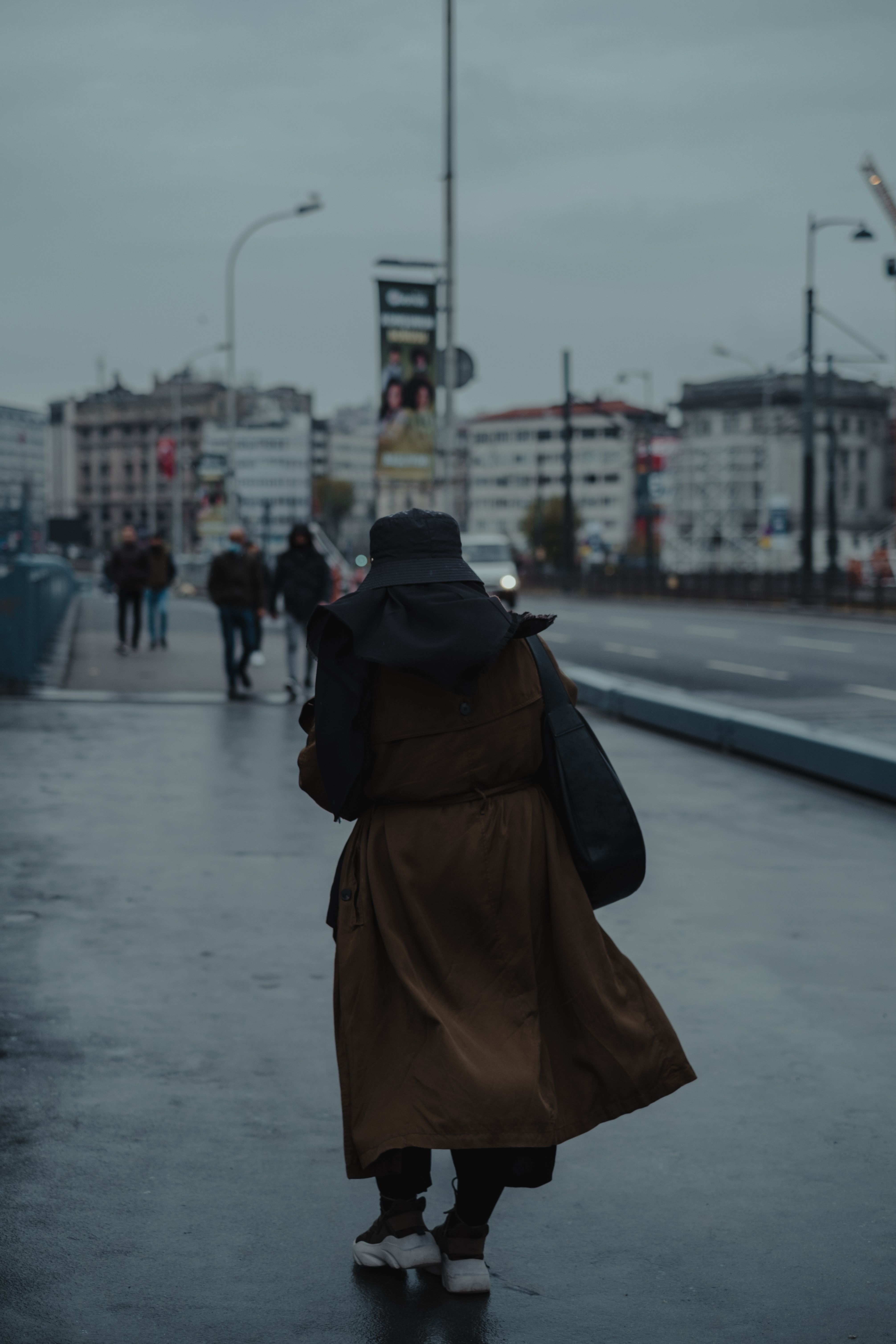 Crop faceless people walking on creative pavement · Free Stock Photo