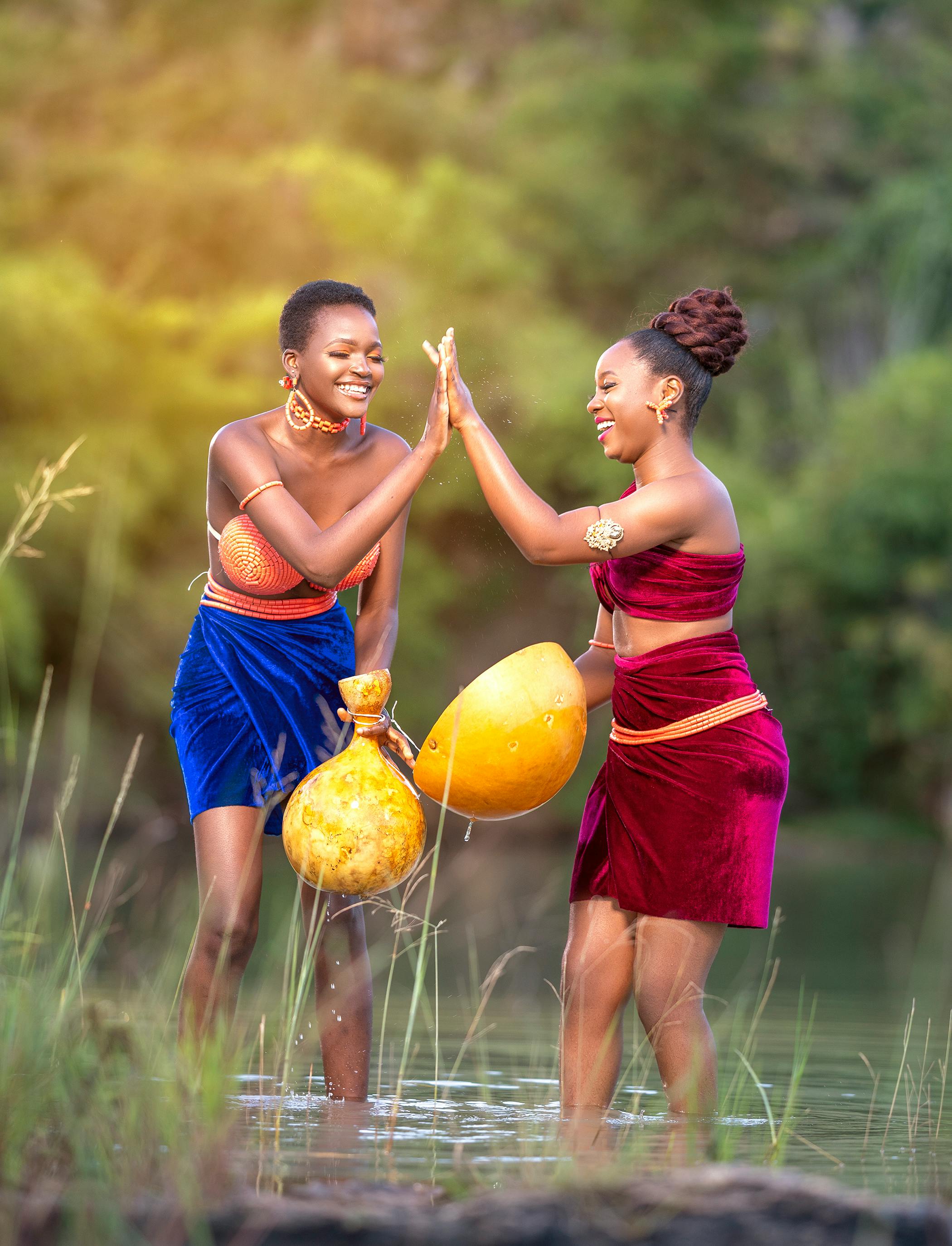 Women Fetching Water in a River · Free Stock Photo