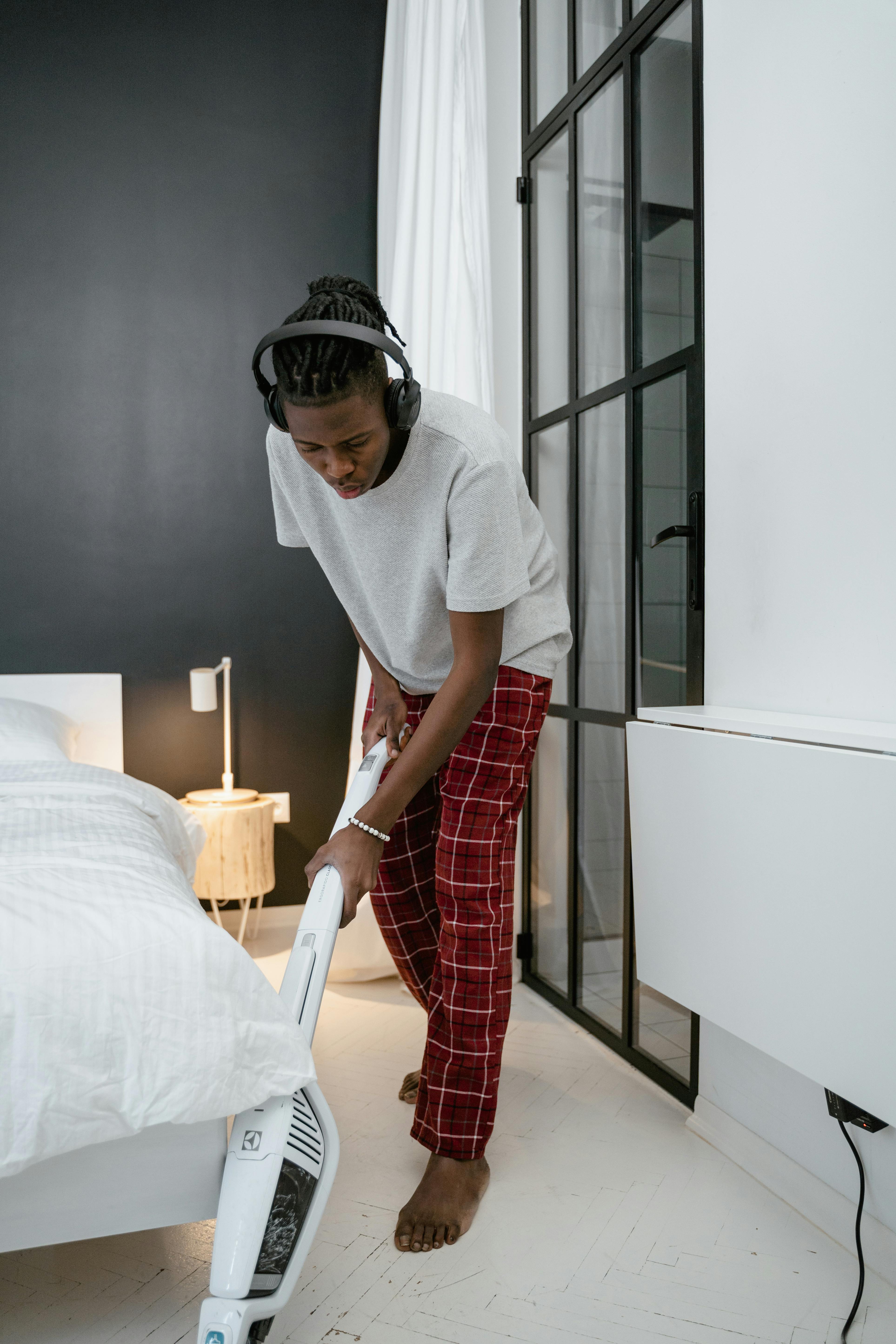 Man cleaning his Room · Free Stock Photo