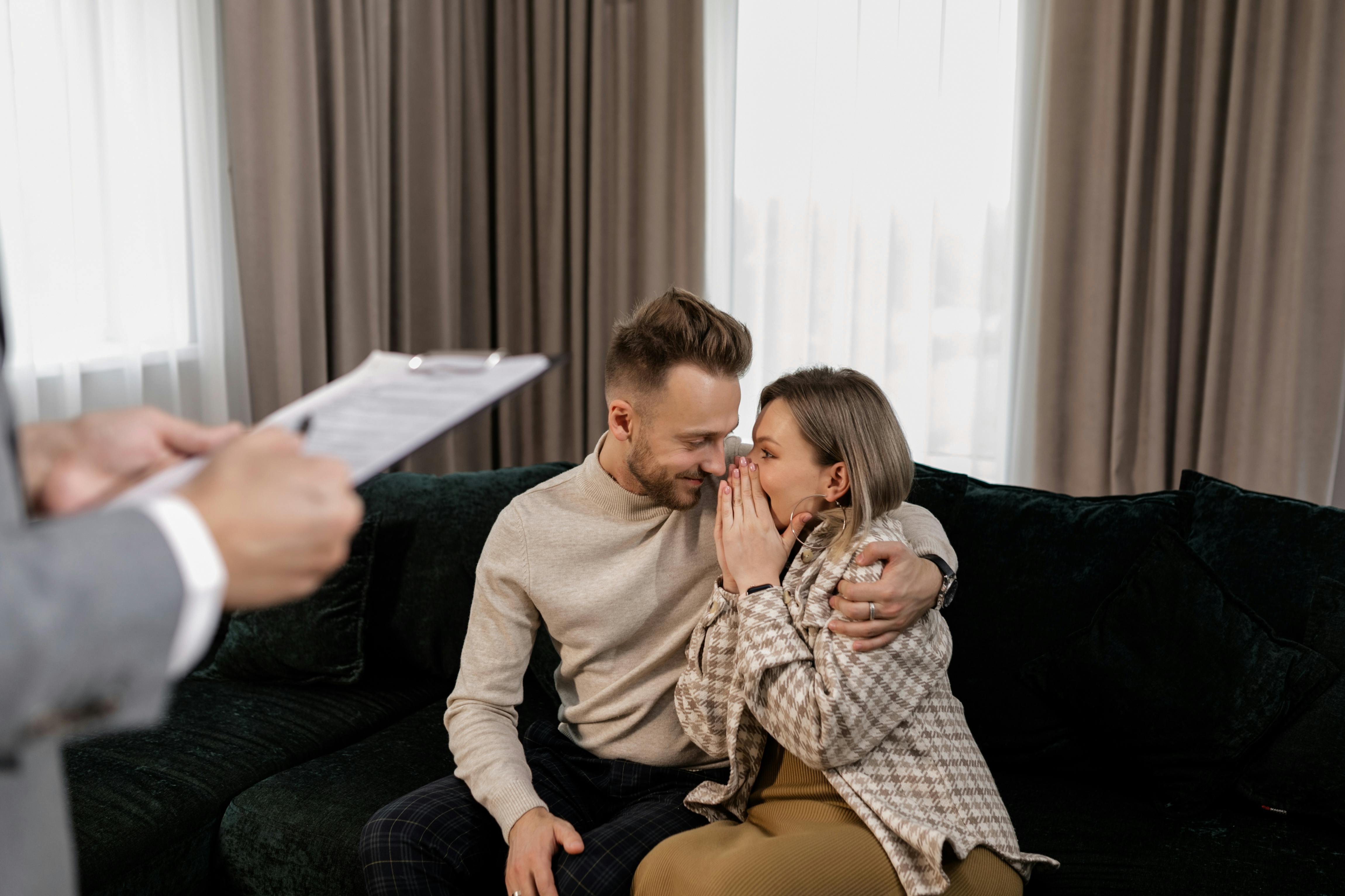 A Couple Whispering to Each Other · Free Stock Photo