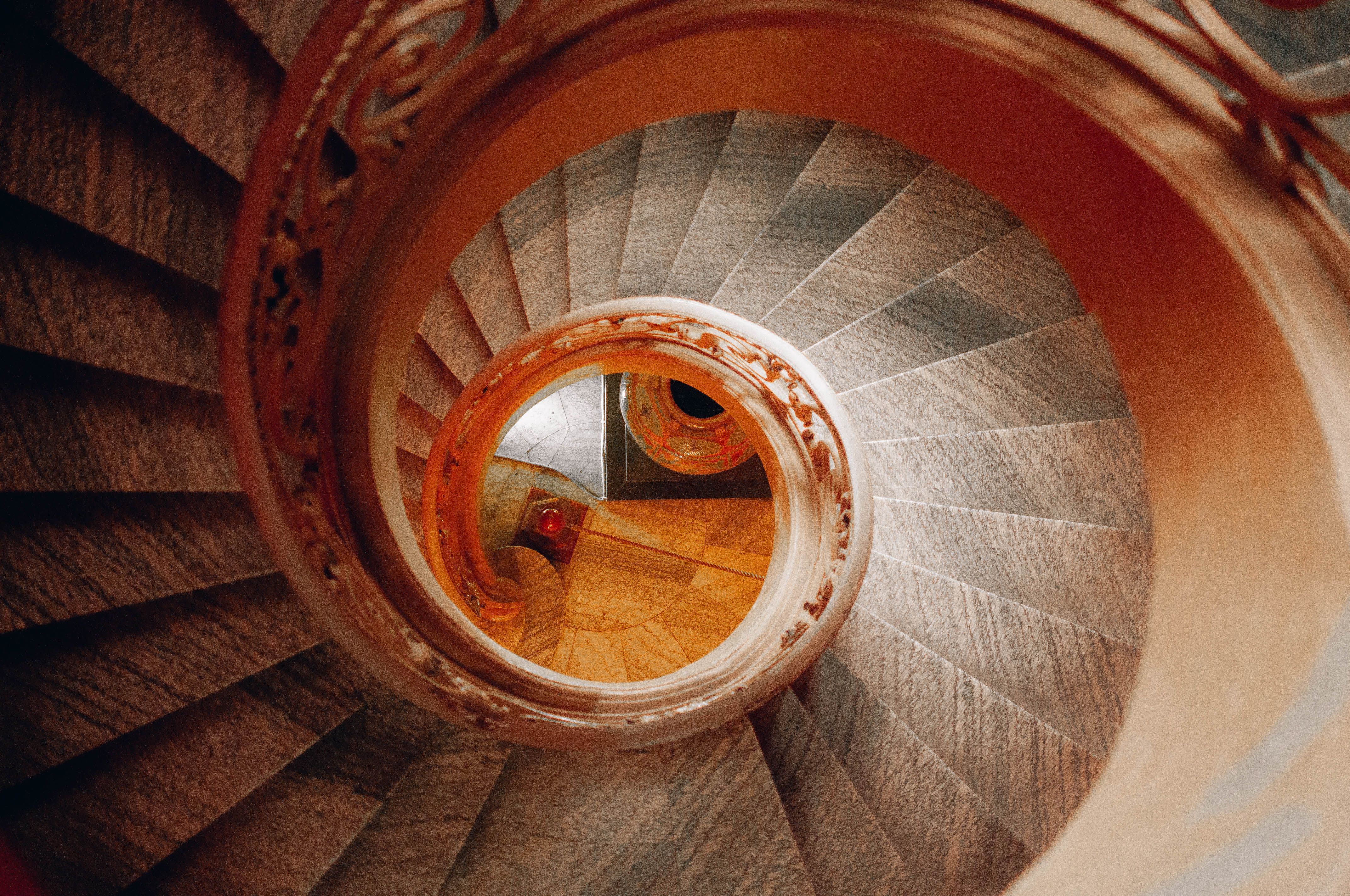 A View from the Top of a Spiral Stairs · Free Stock Photo