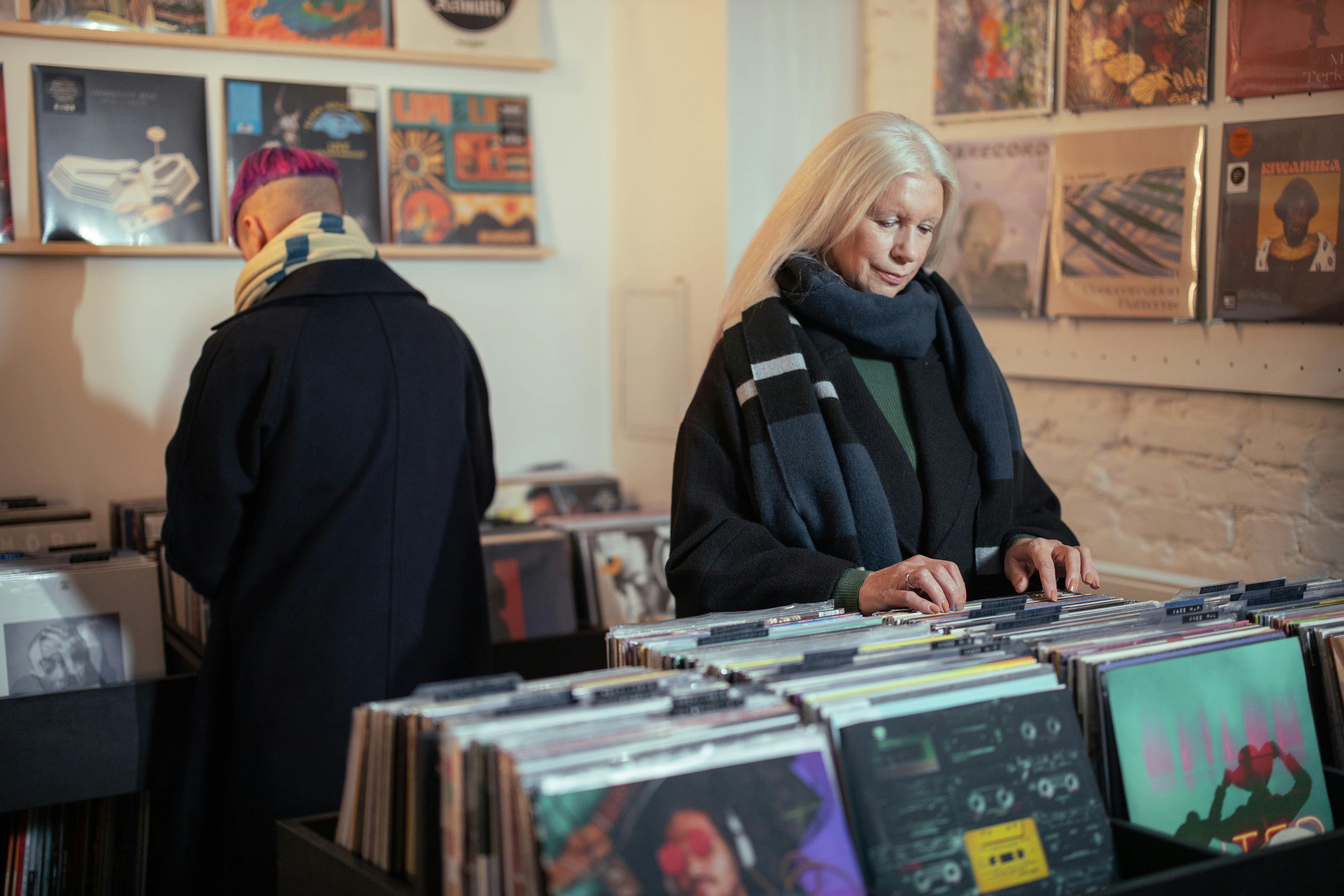 Customers in a Vinyl Record Store · Free Stock Photo