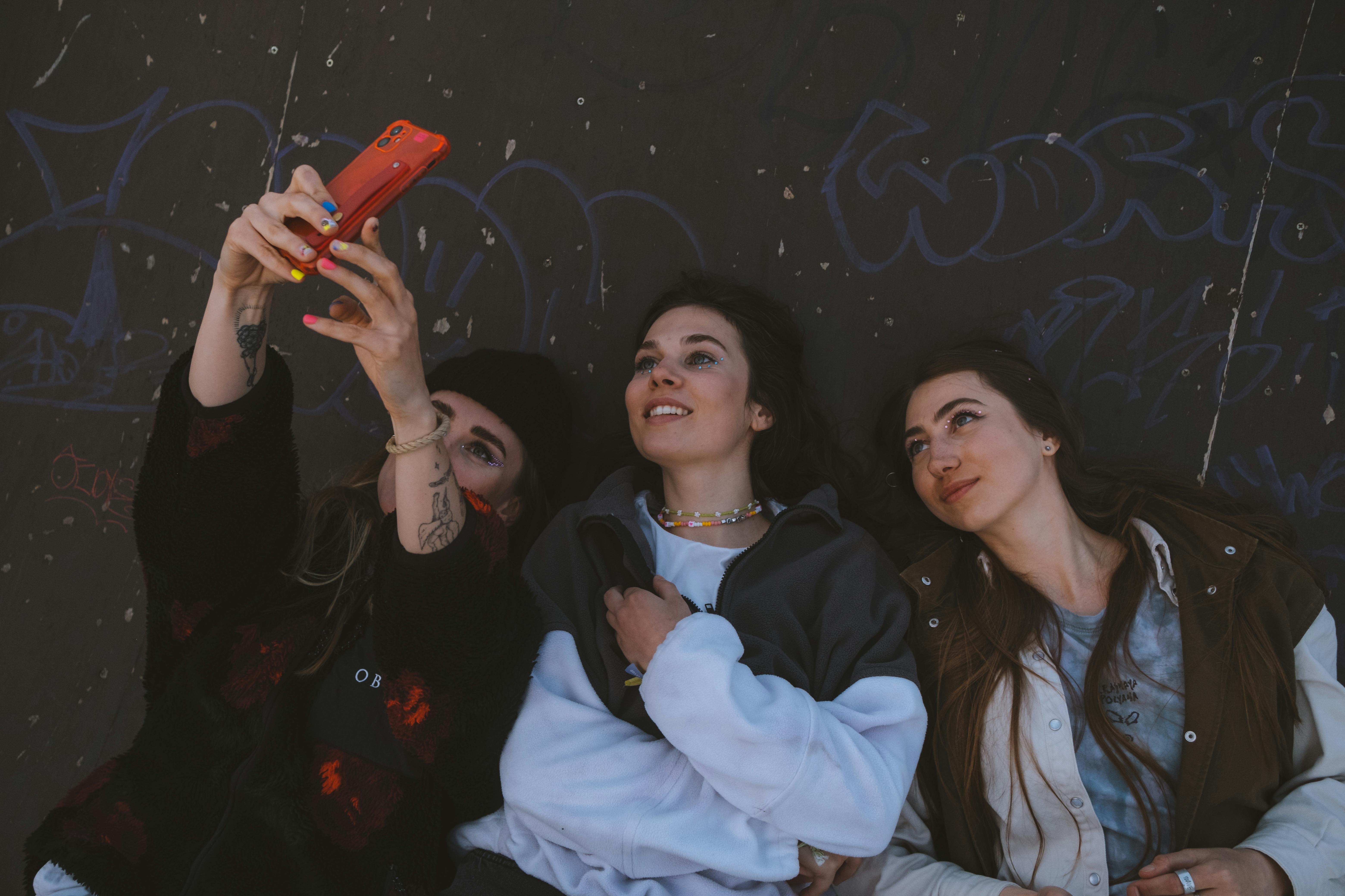Friends Taking a Groupie · Free Stock Photo