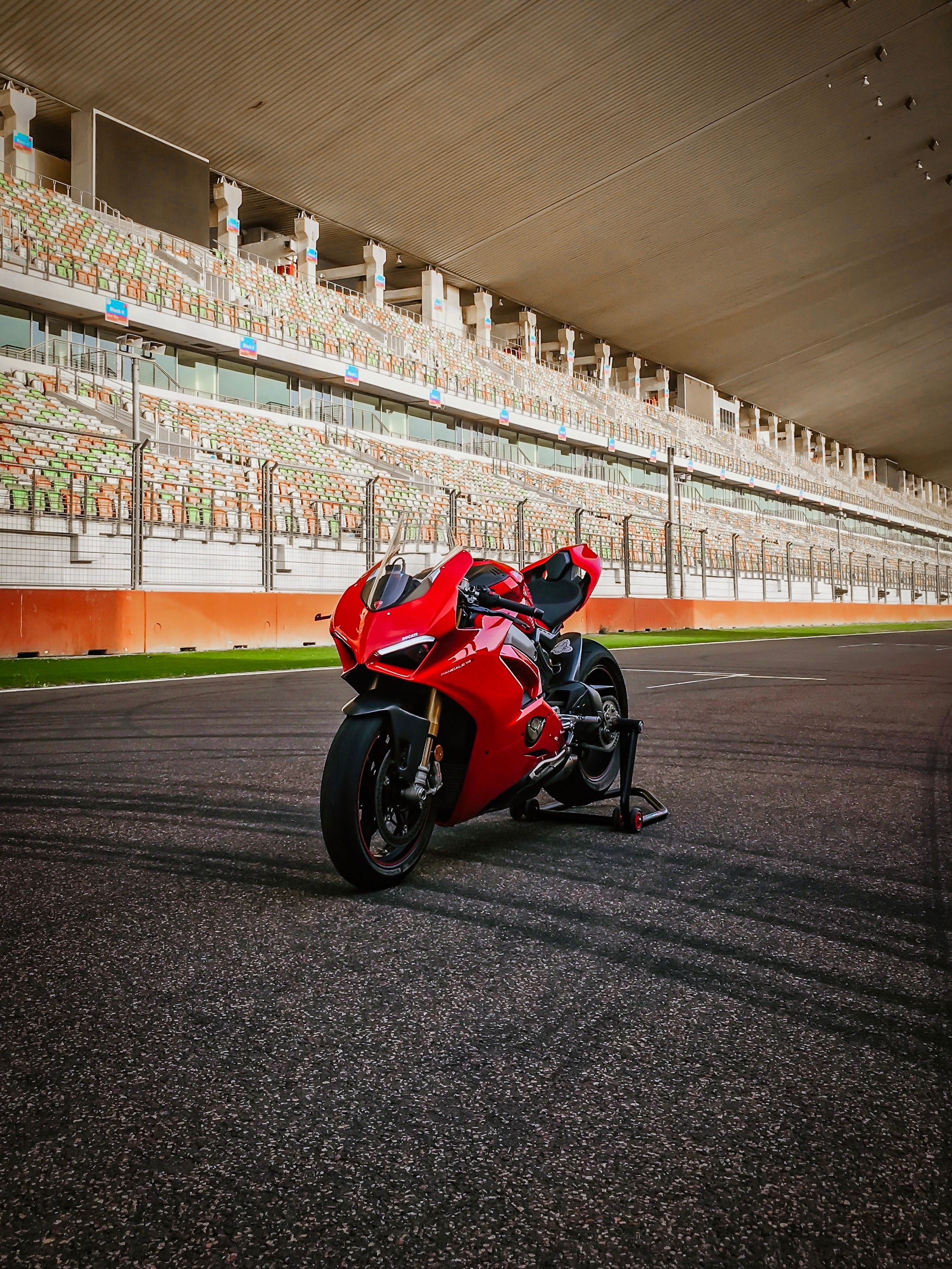 Red Sports Bike in the Middle of Speedway · Free Stock Photo
