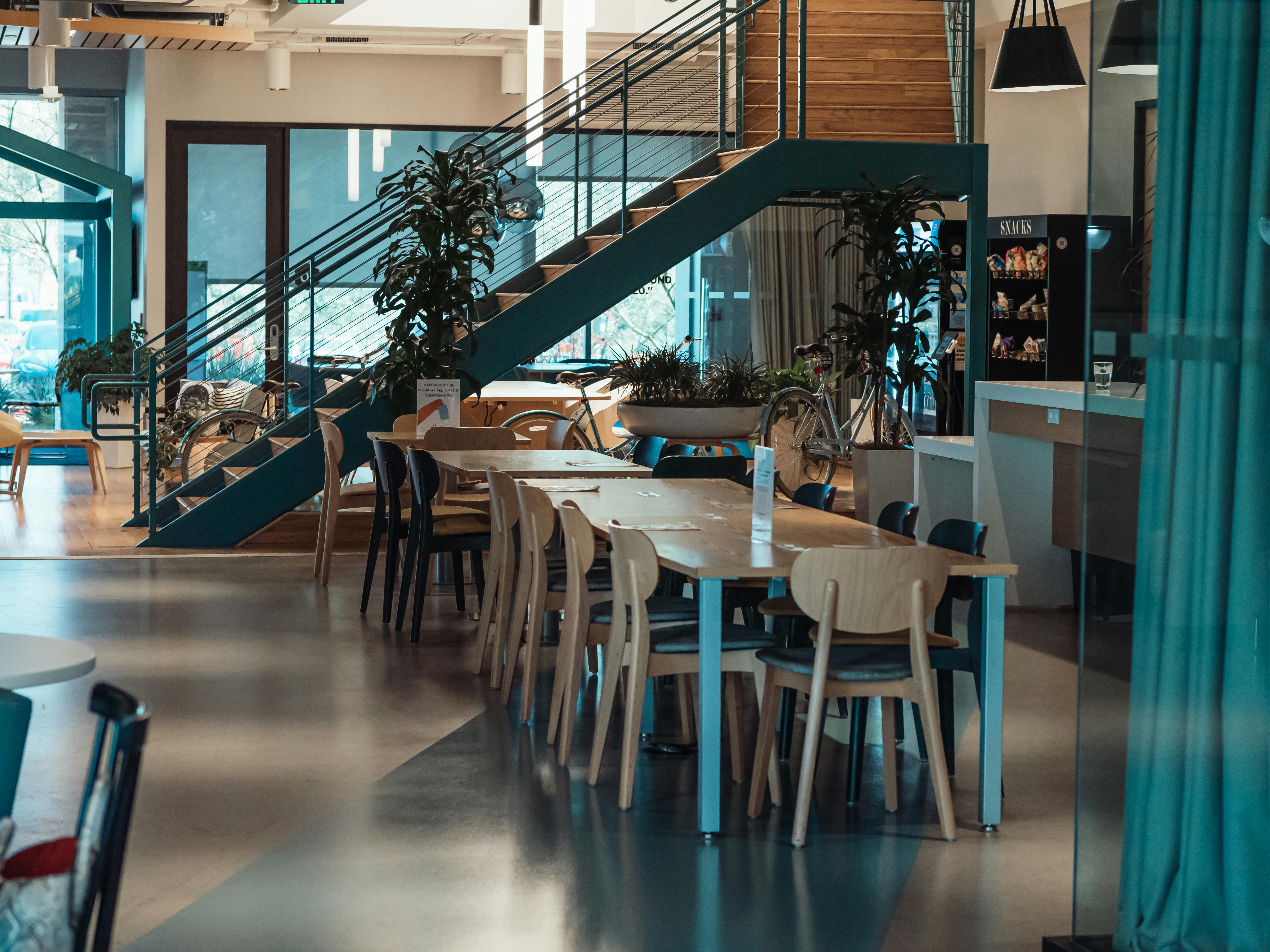 Tables and Chairs in the Cafeteria · Free Stock Photo