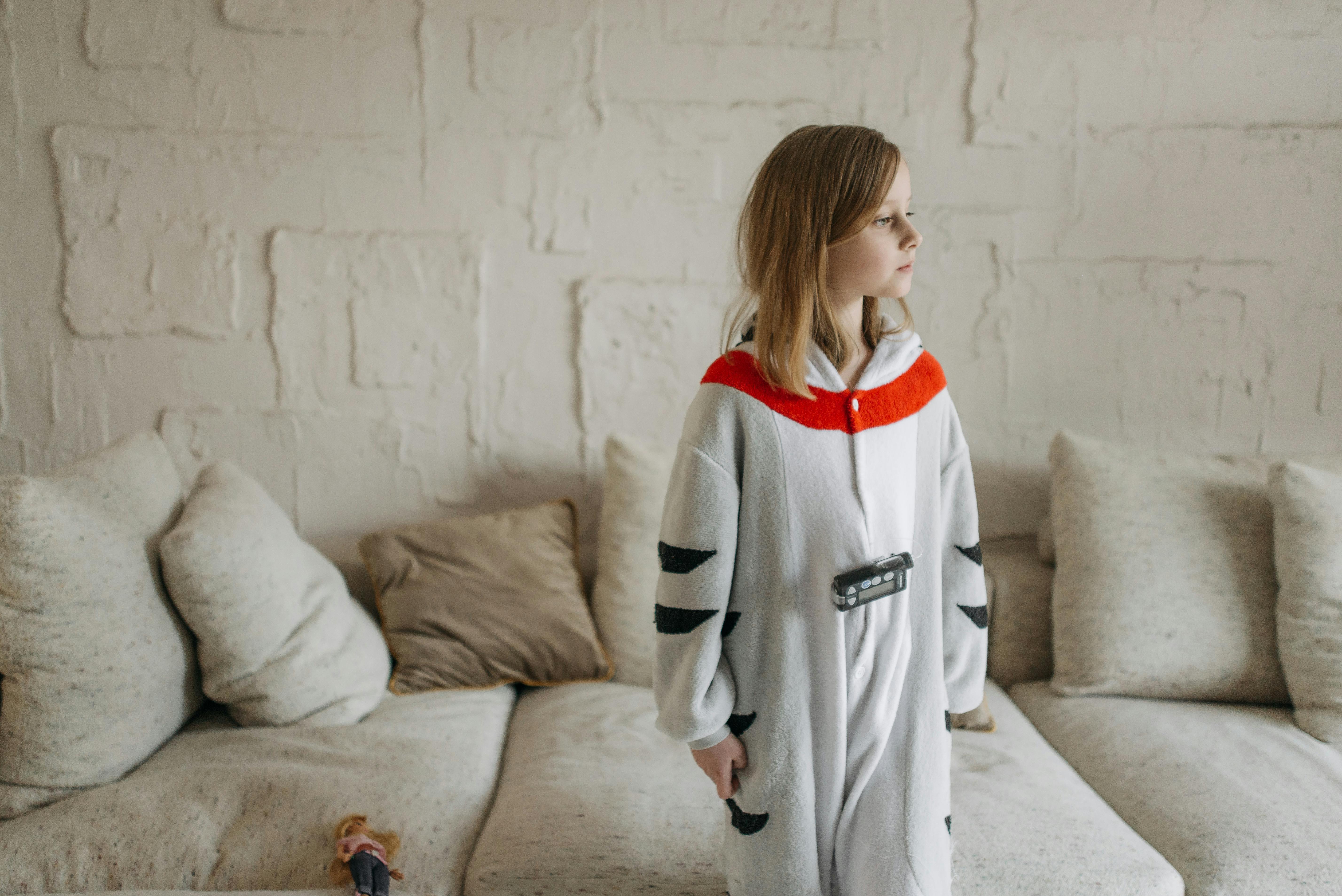 A Girl Wearing a Onesie · Free Stock Photo
