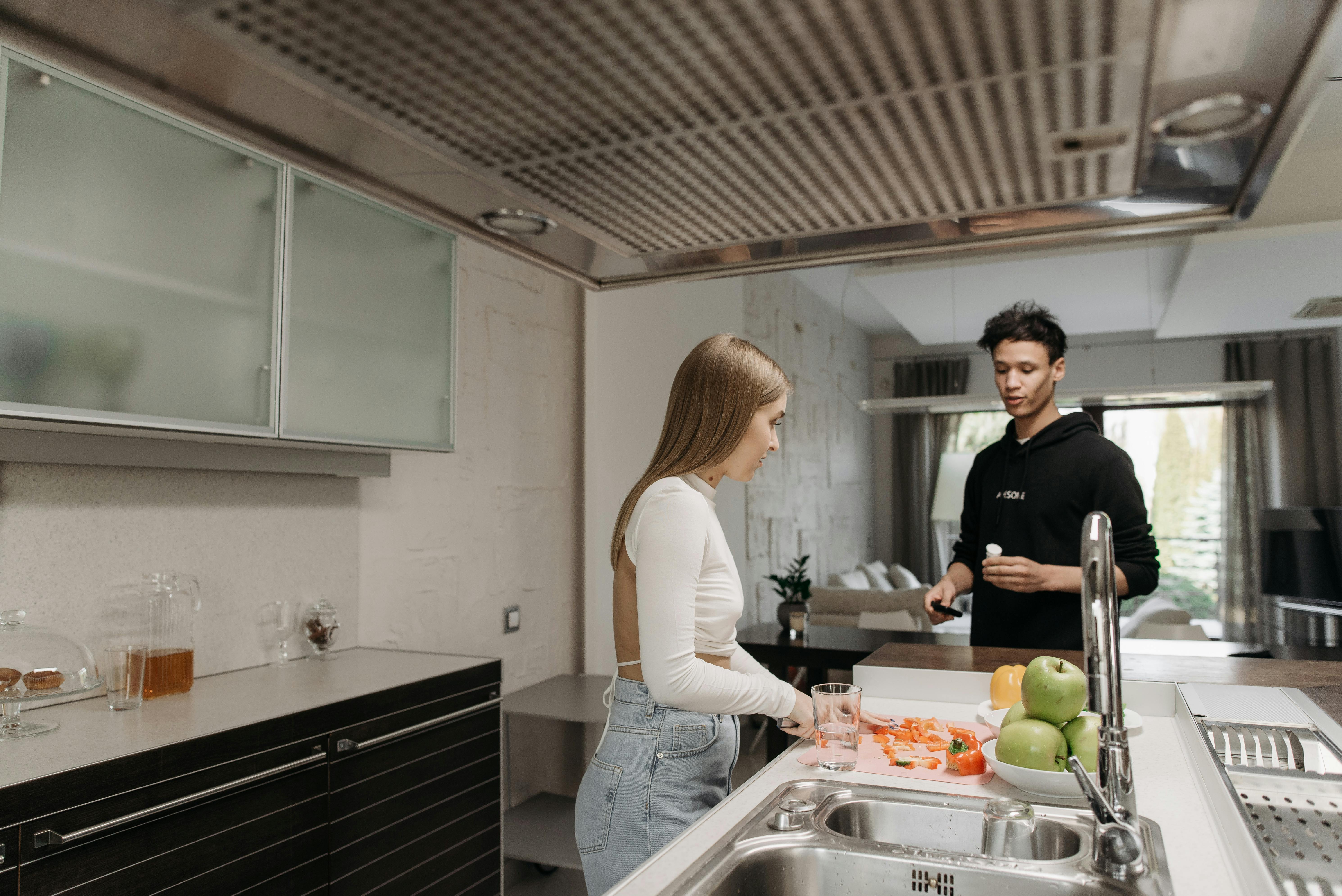 A Couple in a Kitchen · Free Stock Photo
