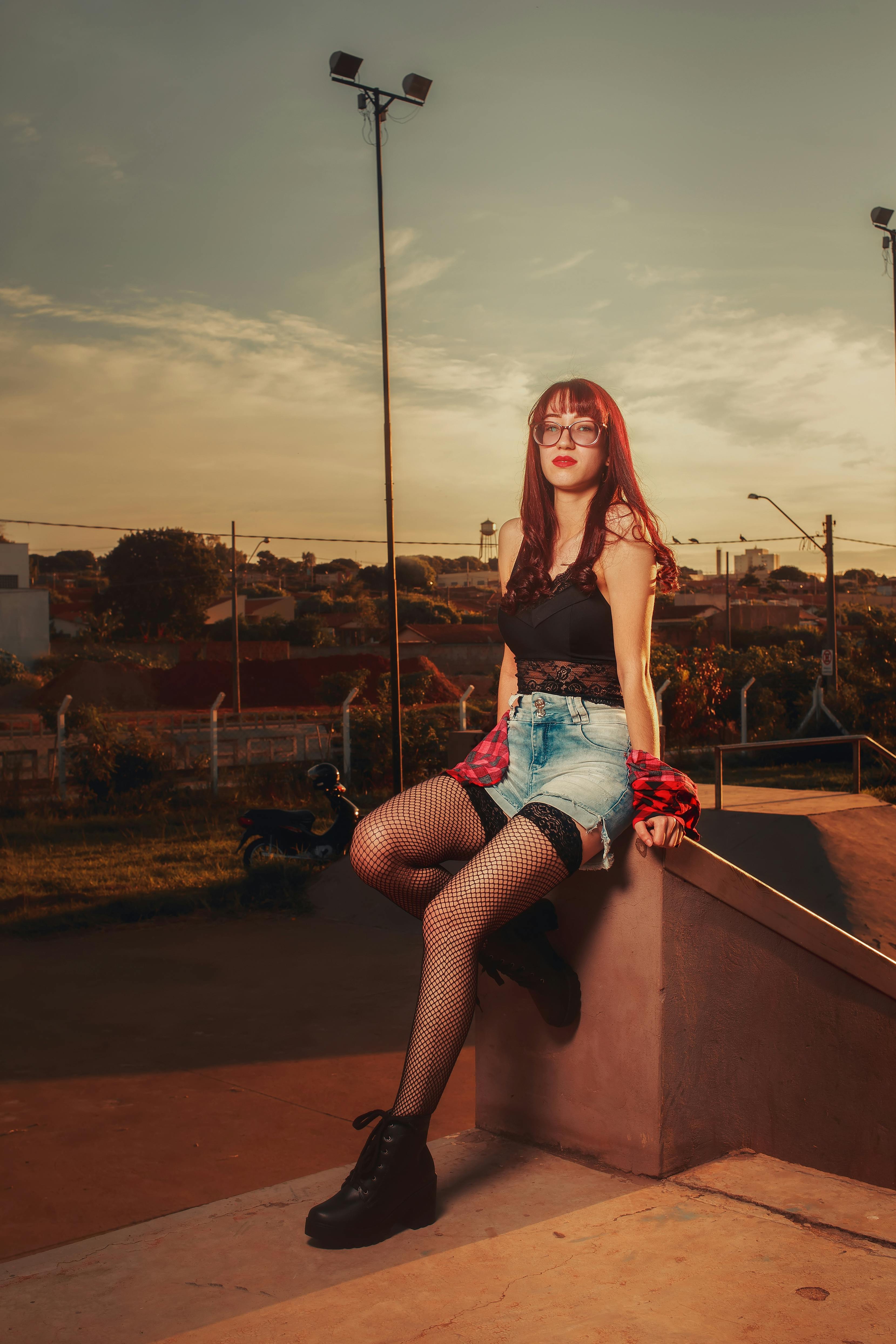 Woman Posing by Wall · Free Stock Photo