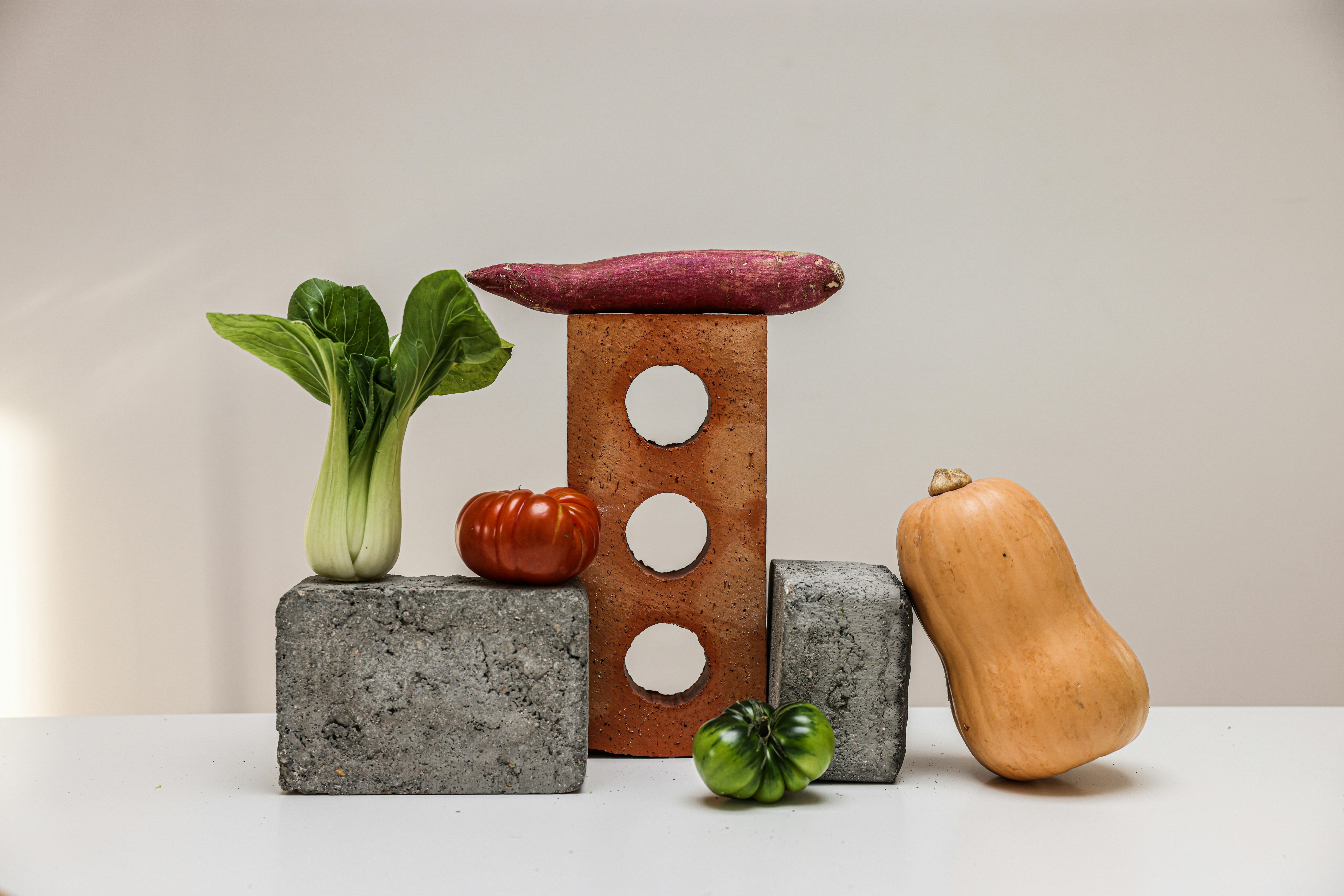 Vegetables Set on Concrete Blocks · Free Stock Photo