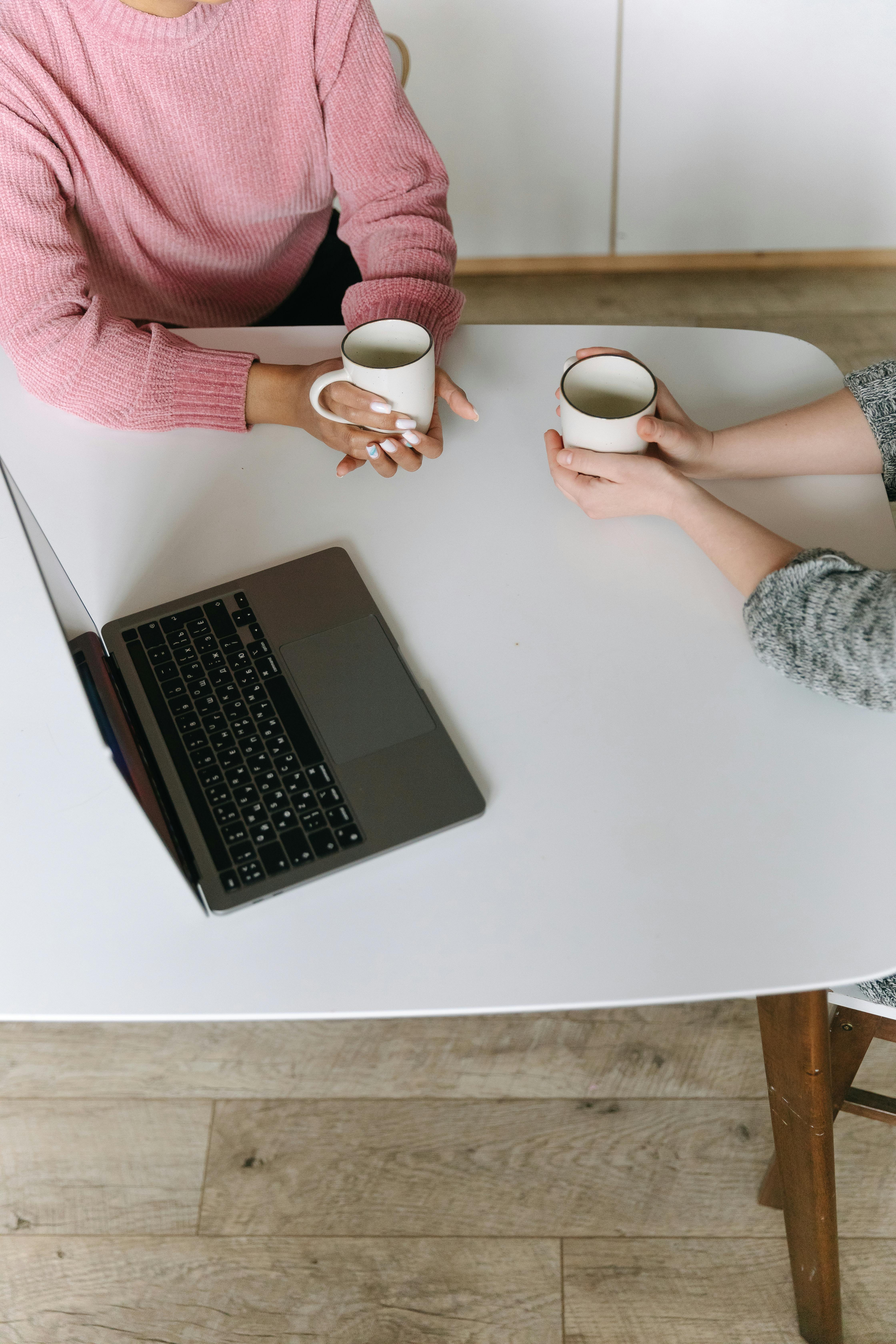 Top View of a Person Using a Laptop · Free Stock Photo