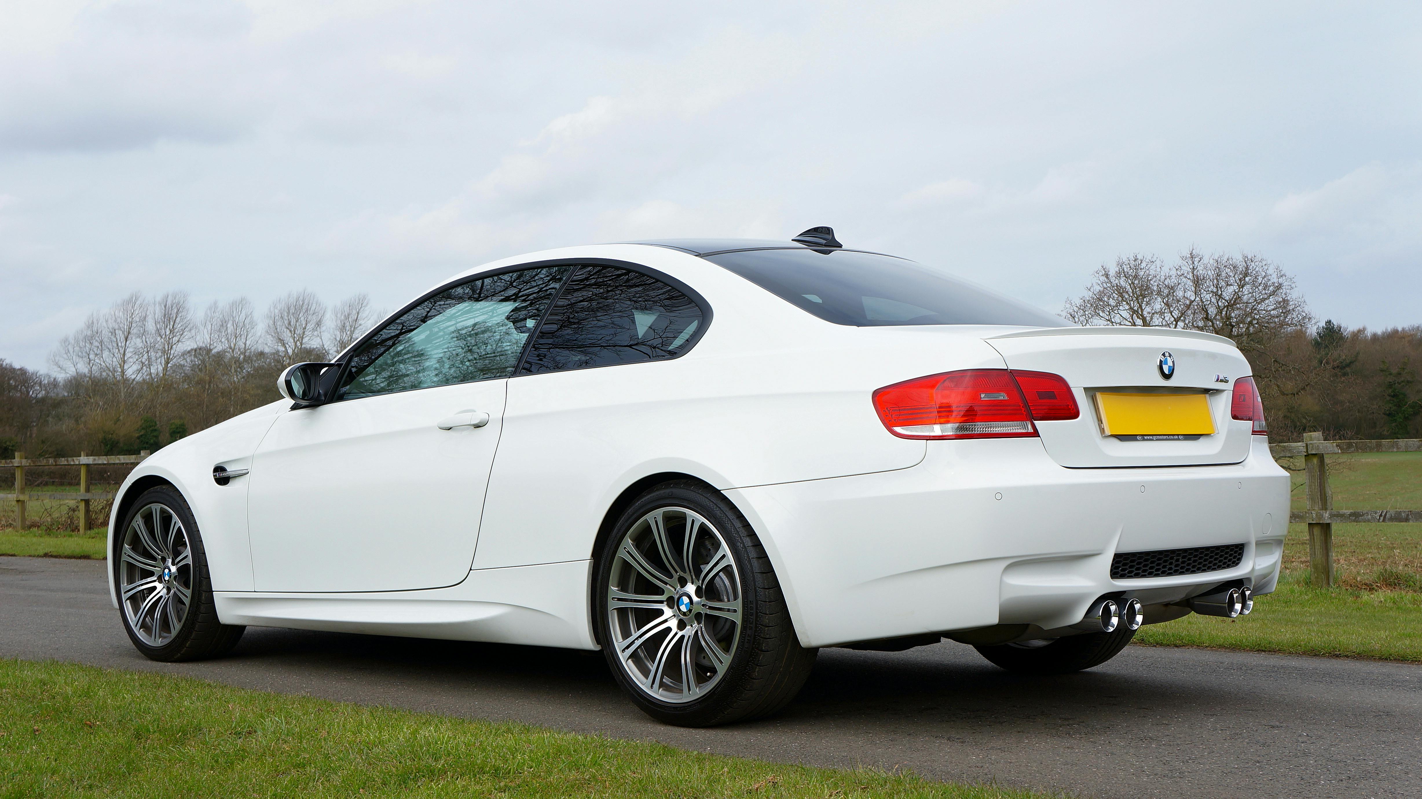 Side View of a White BMW M3 · Free Stock Photo