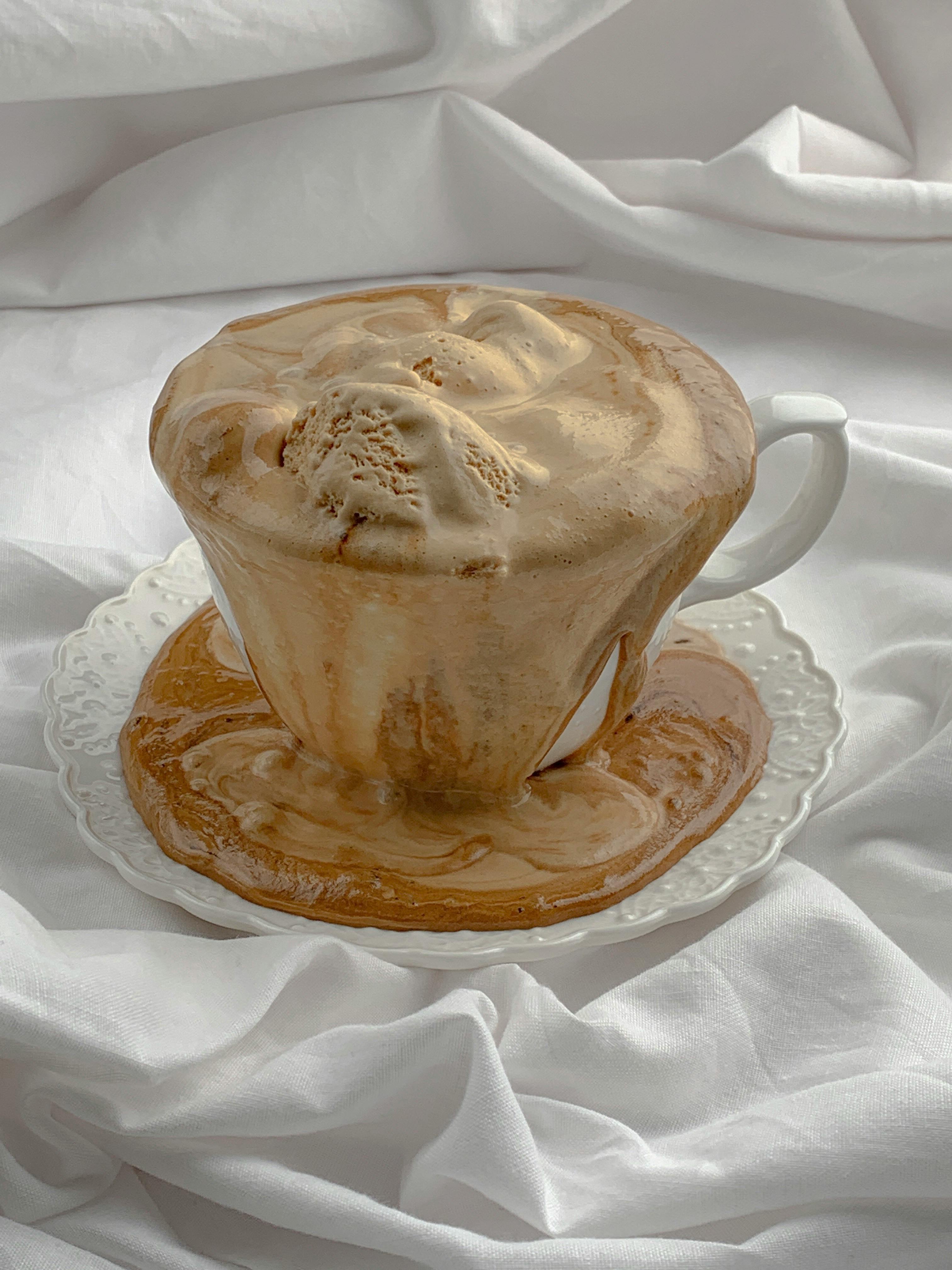 Overflowing Cup of Coffee · Free Stock Photo