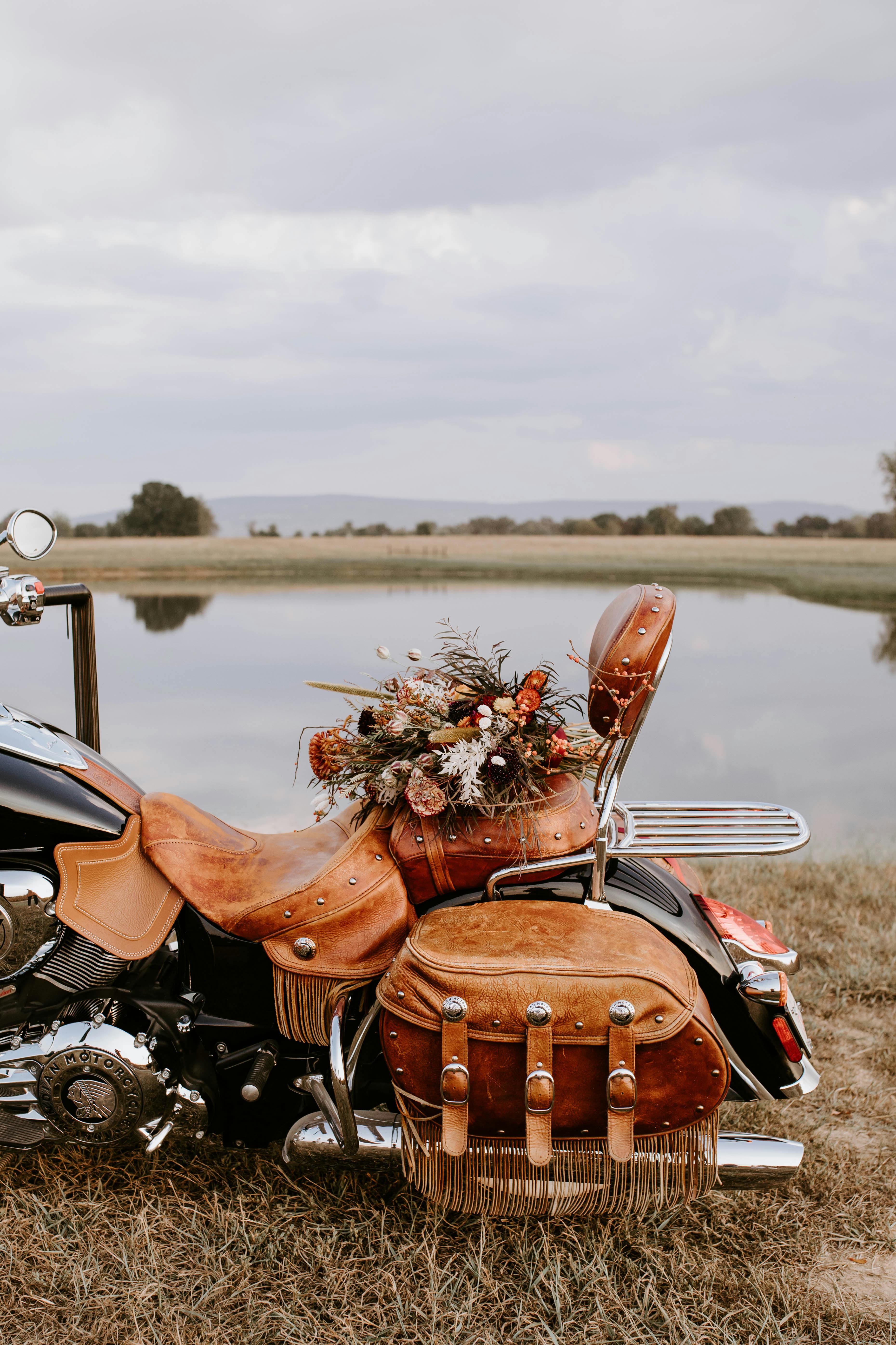 Brown and Black Cruiser Motorcycle on Gray Sand · Free Stock Photo