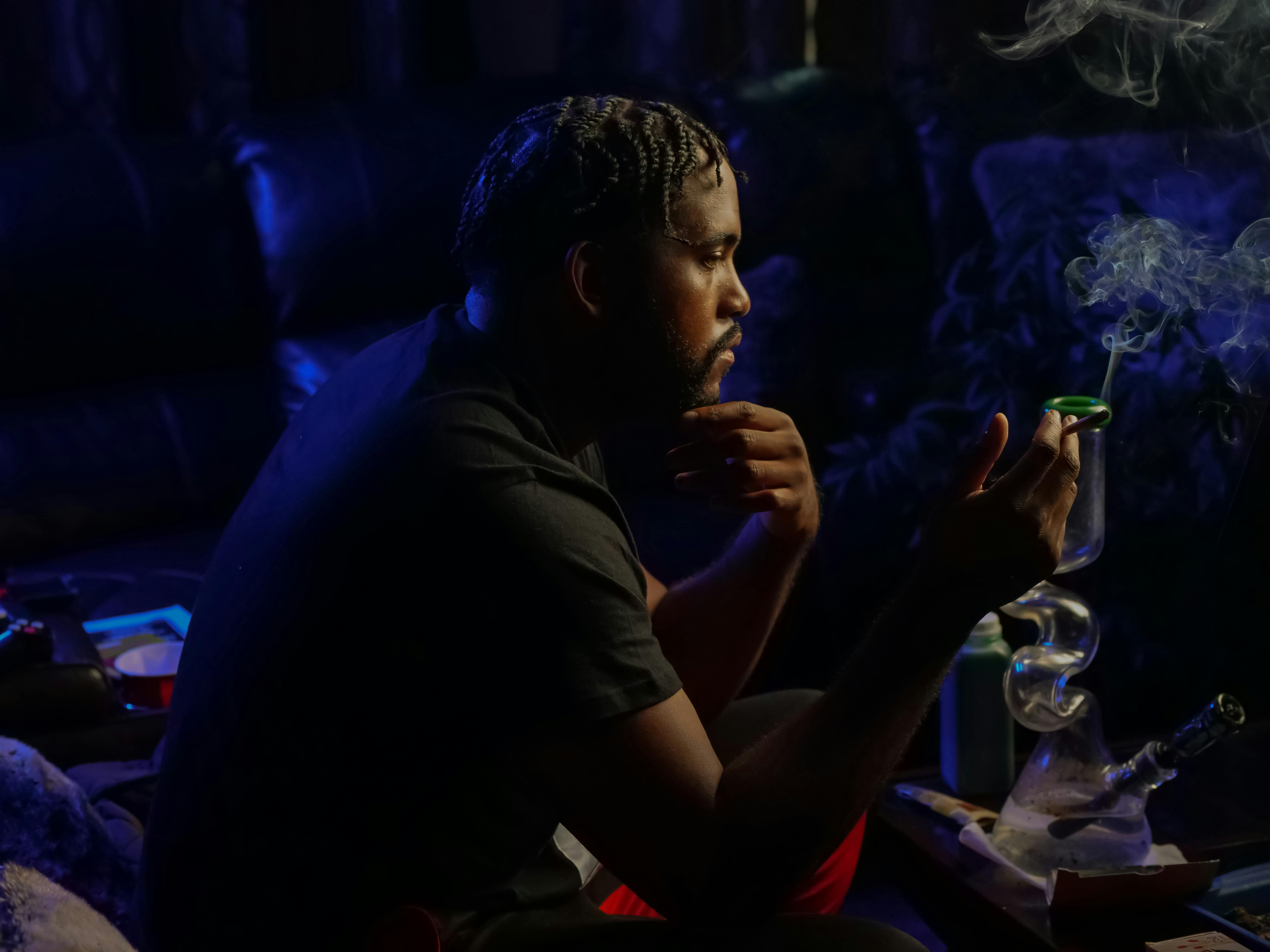 Man Smoking a Cigarette · Free Stock Photo