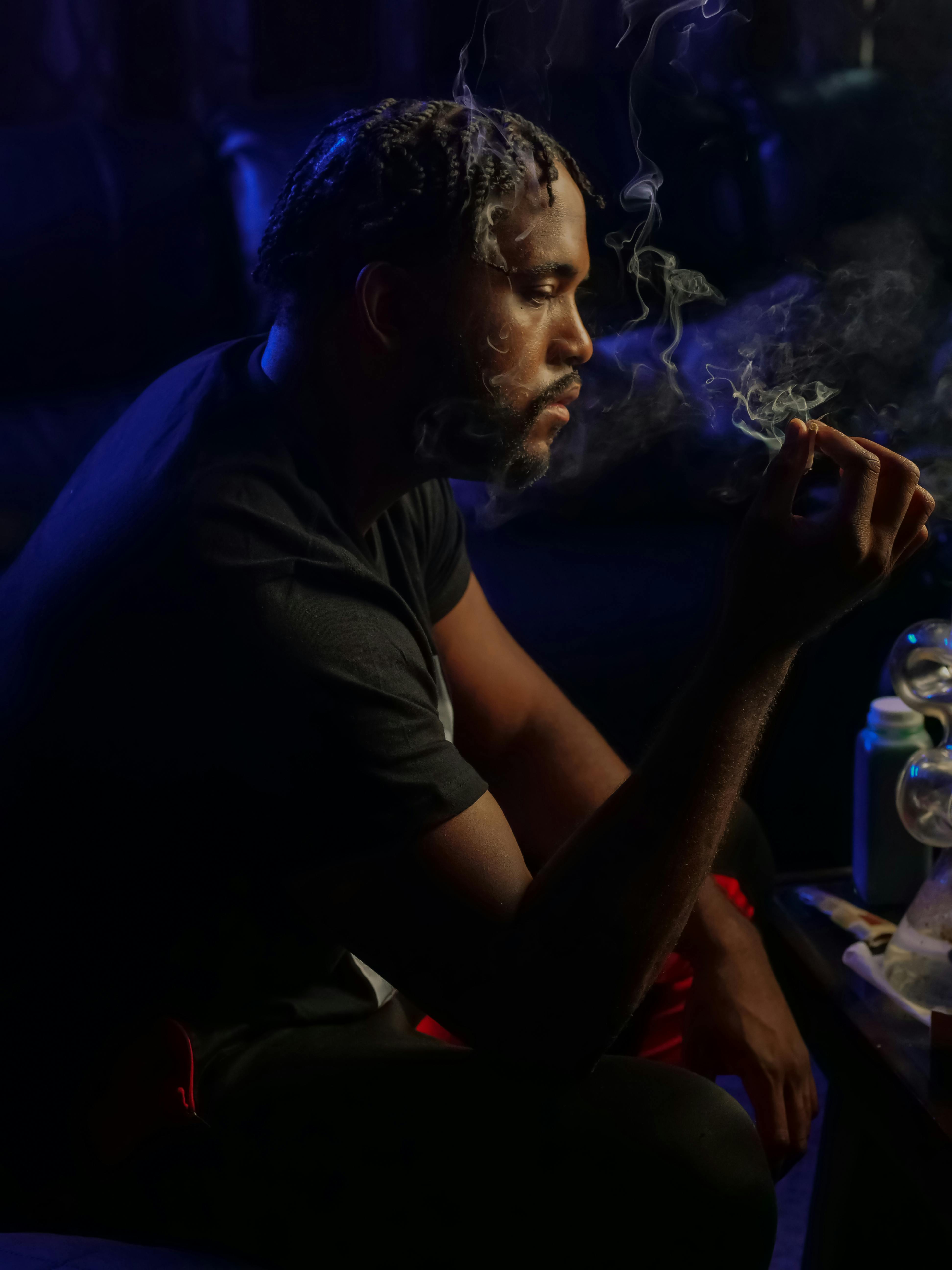 Man Smoking a Cigarette · Free Stock Photo