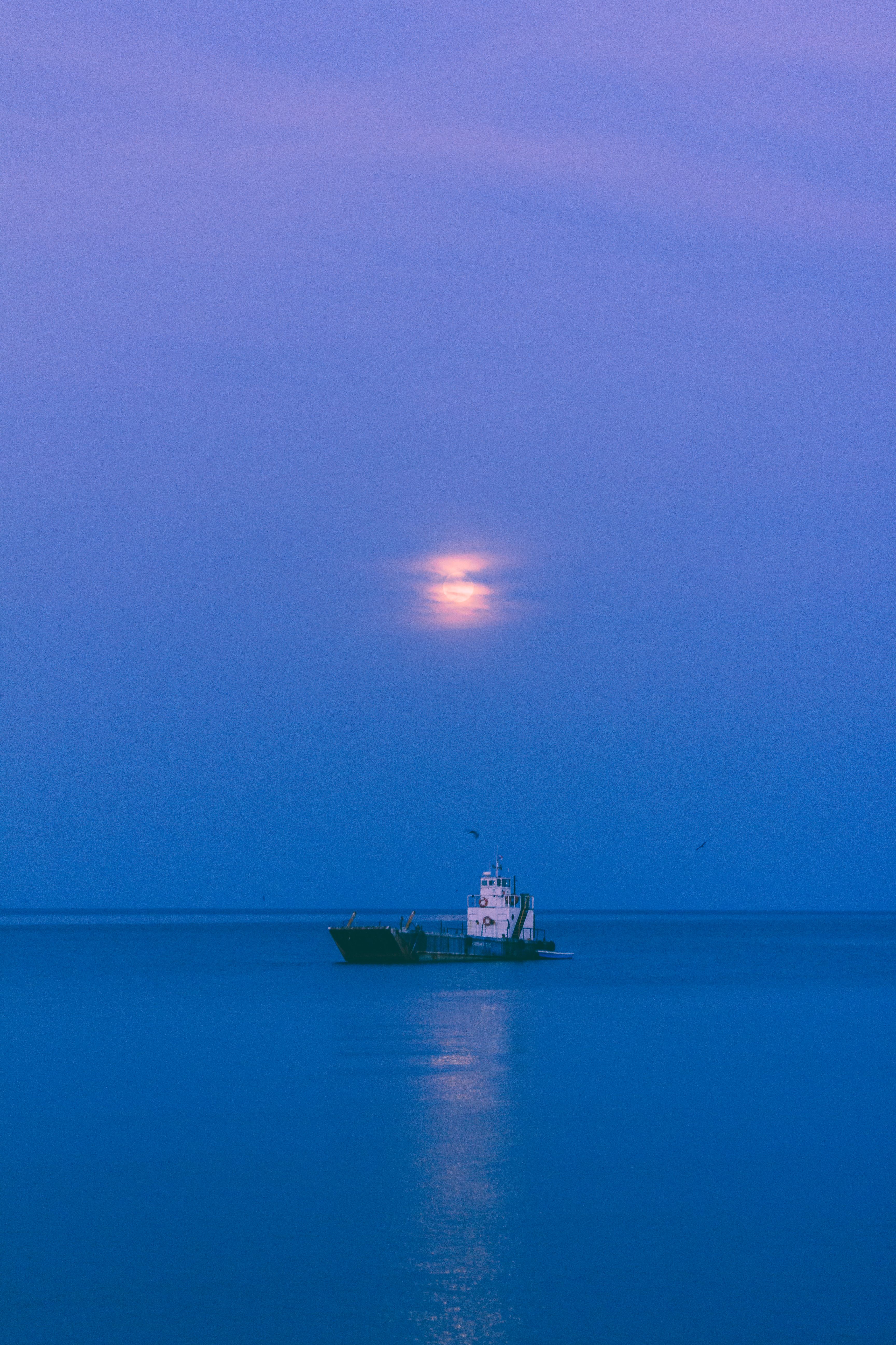 Boat on Sea during Night Time · Free Stock Photo