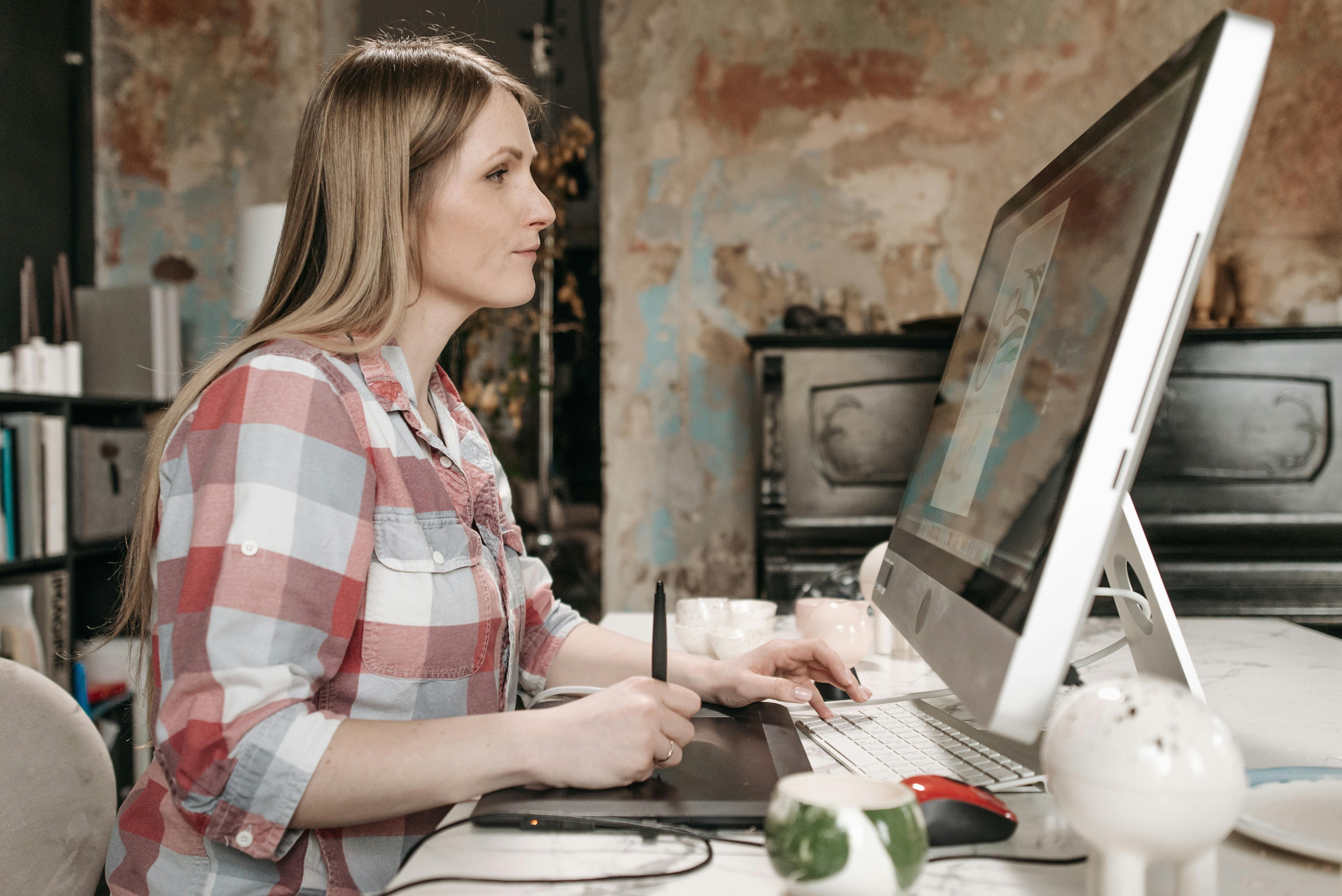A Woman using Computer · Free Stock Photo