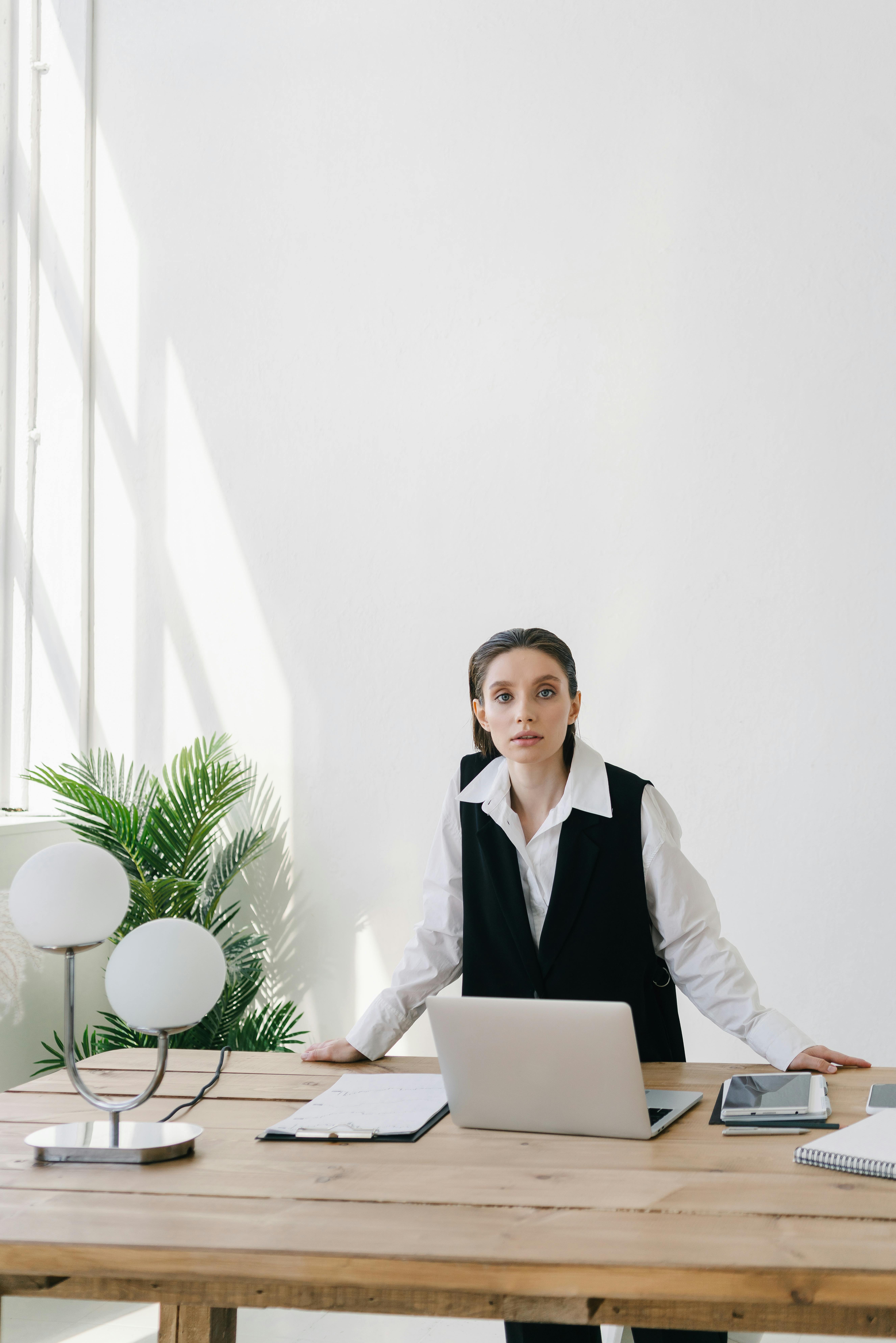 Woman Standing by the Table · Free Stock Photo