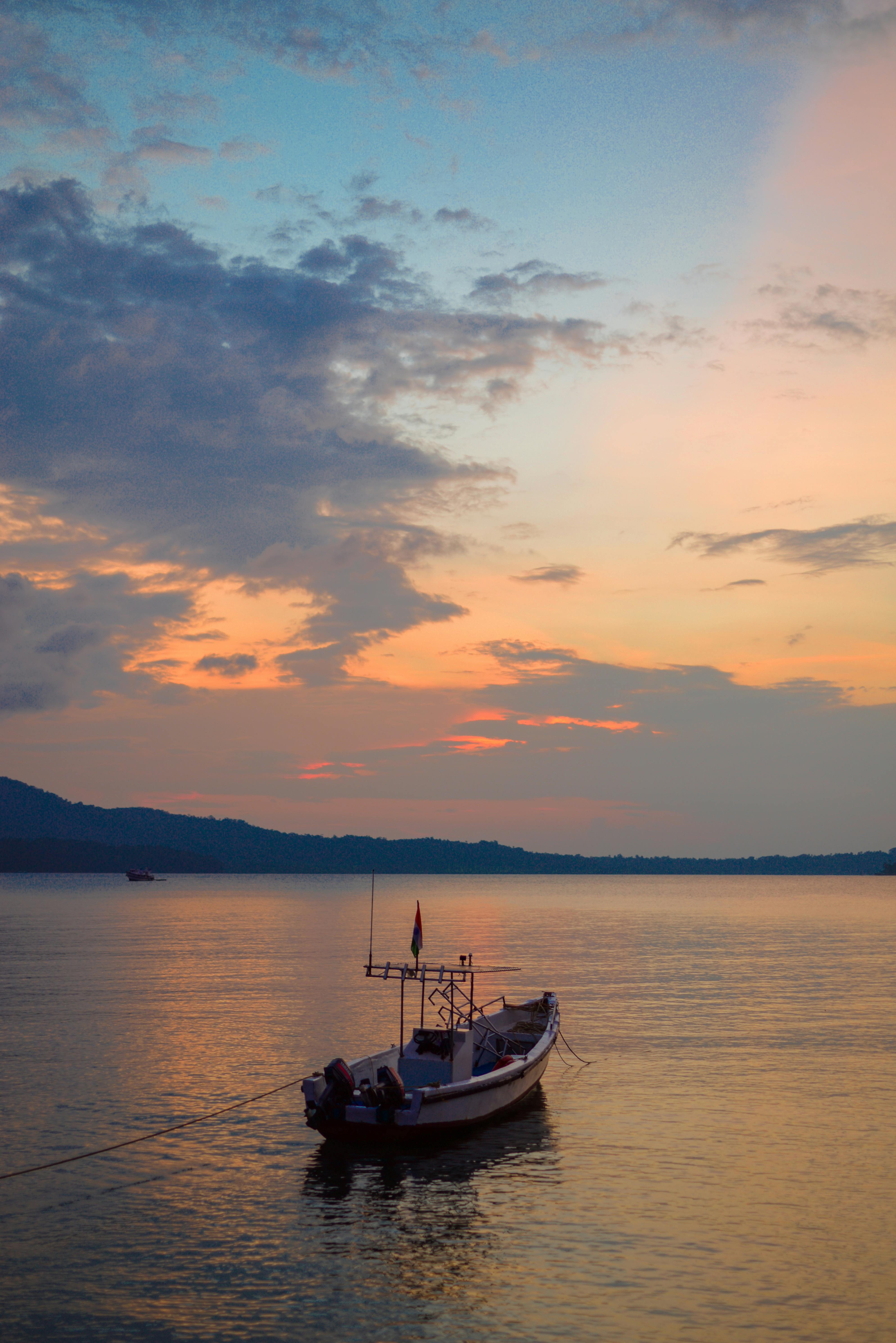 Free stock photo of anchored, boat, clouds