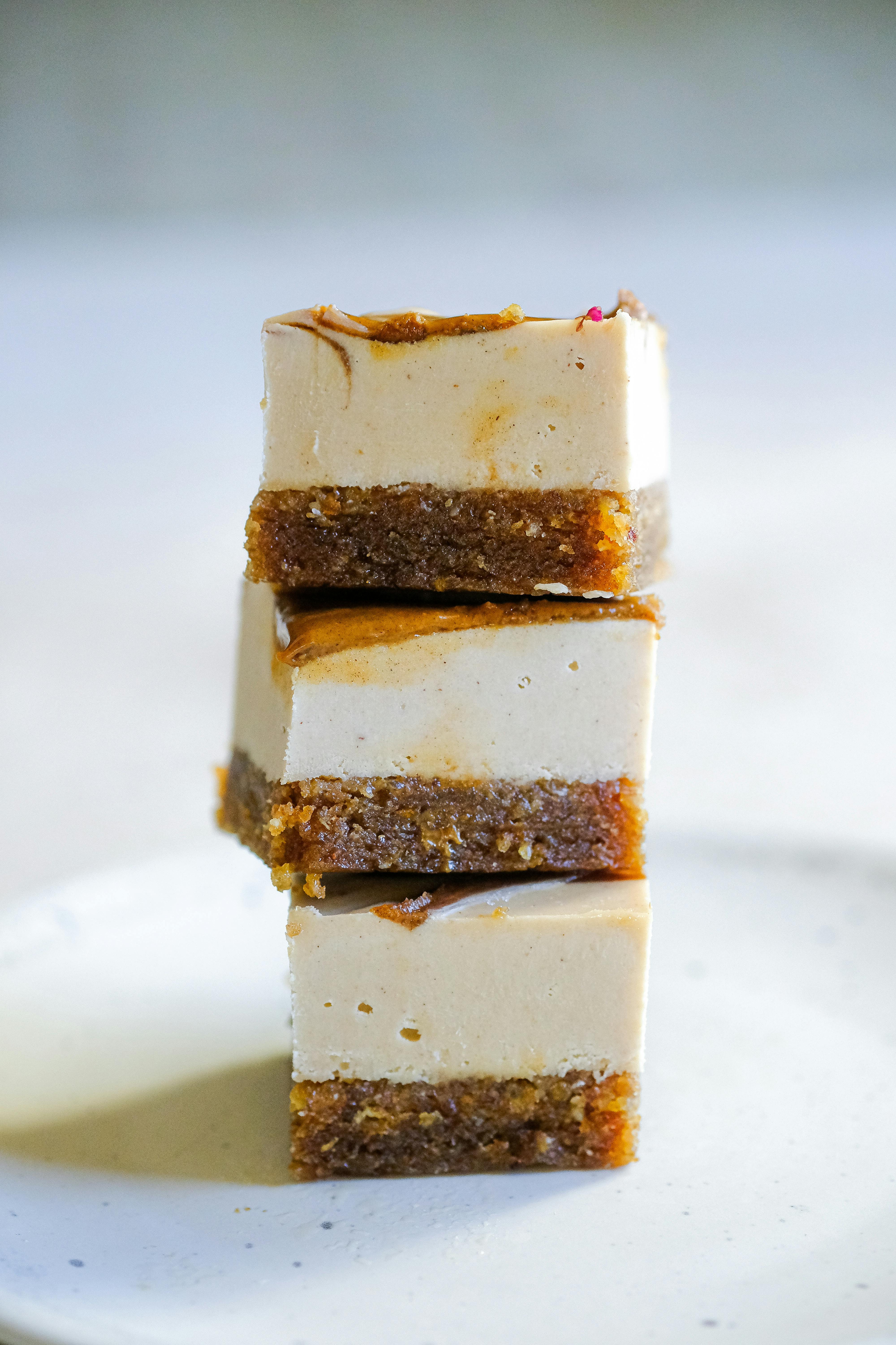 A Close-Up Shot of a Stack of Delicious Cheesecake · Free Stock Photo