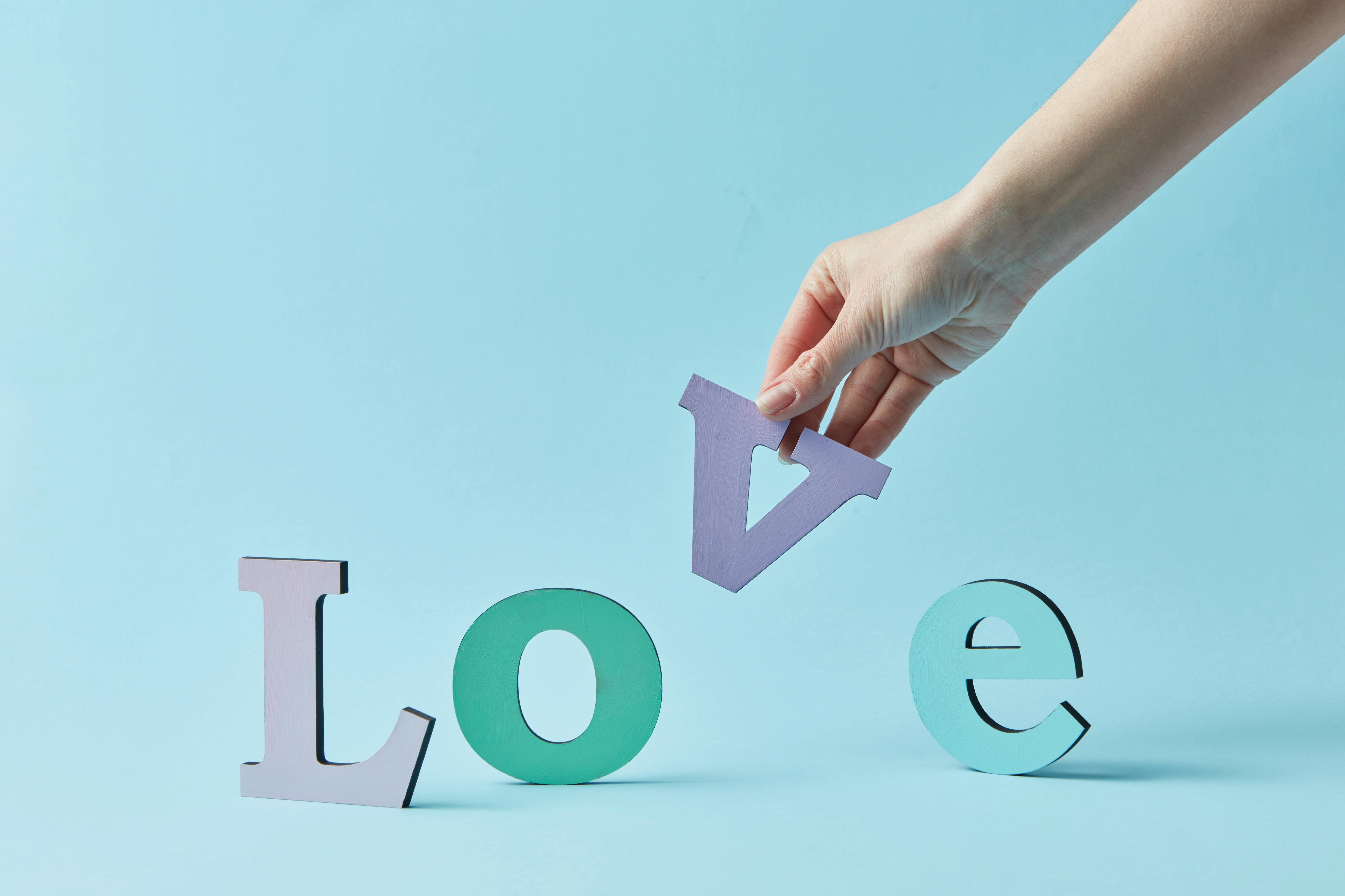 Woman Hands over Love Text · Free Stock Photo