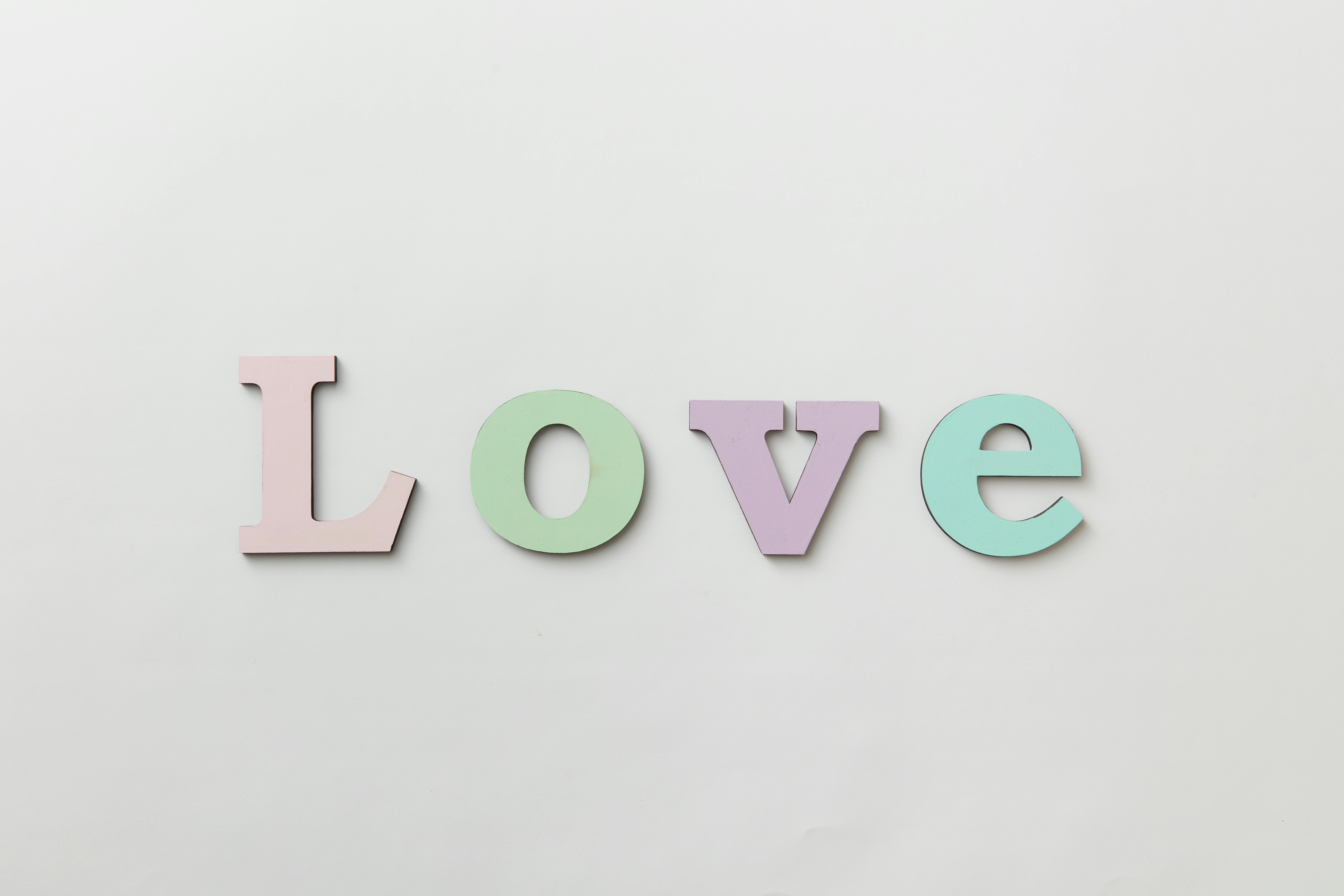 Love Text on White Background · Free Stock Photo
