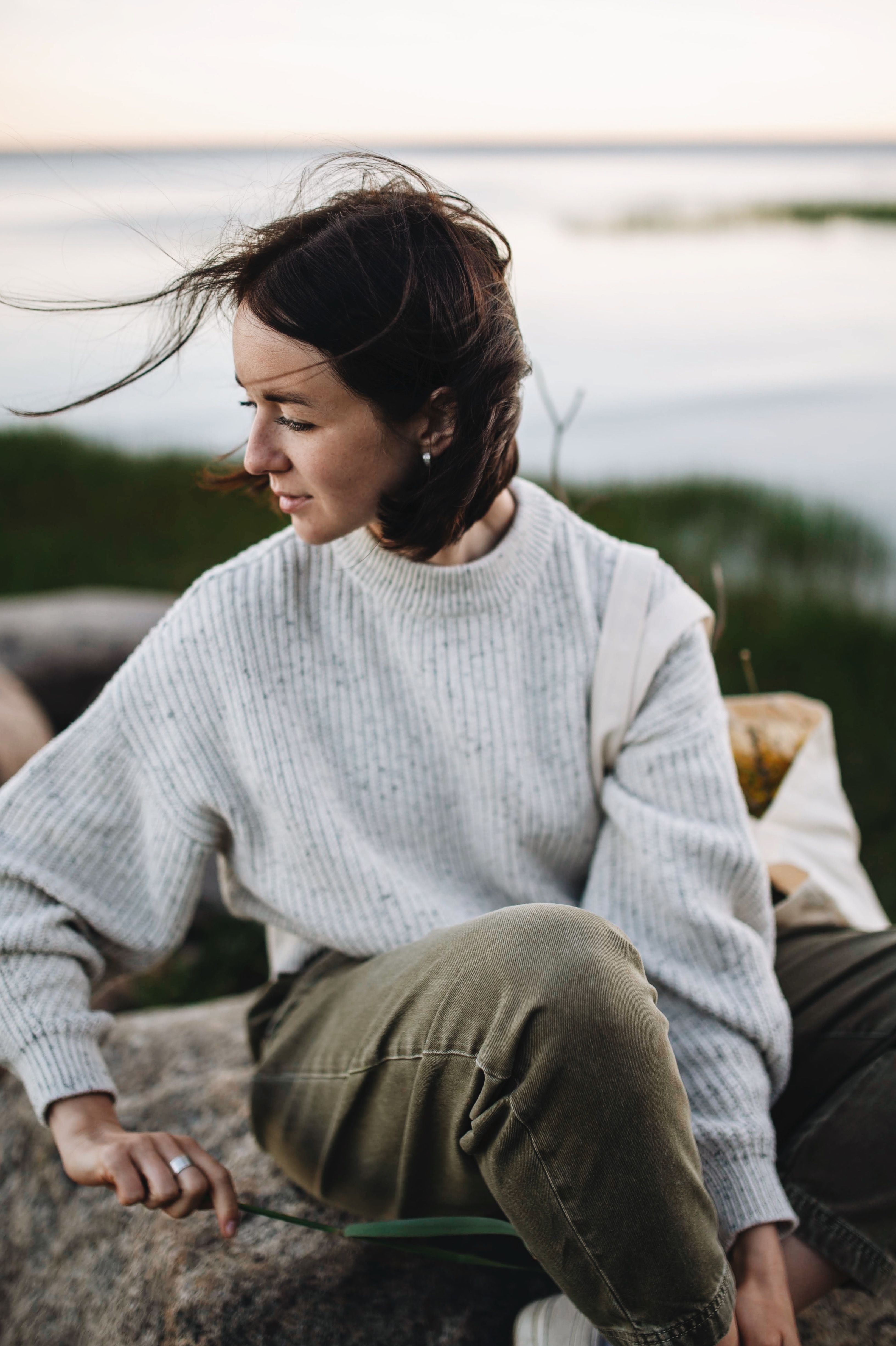 Sitting Woman in Sweater · Free Stock Photo
