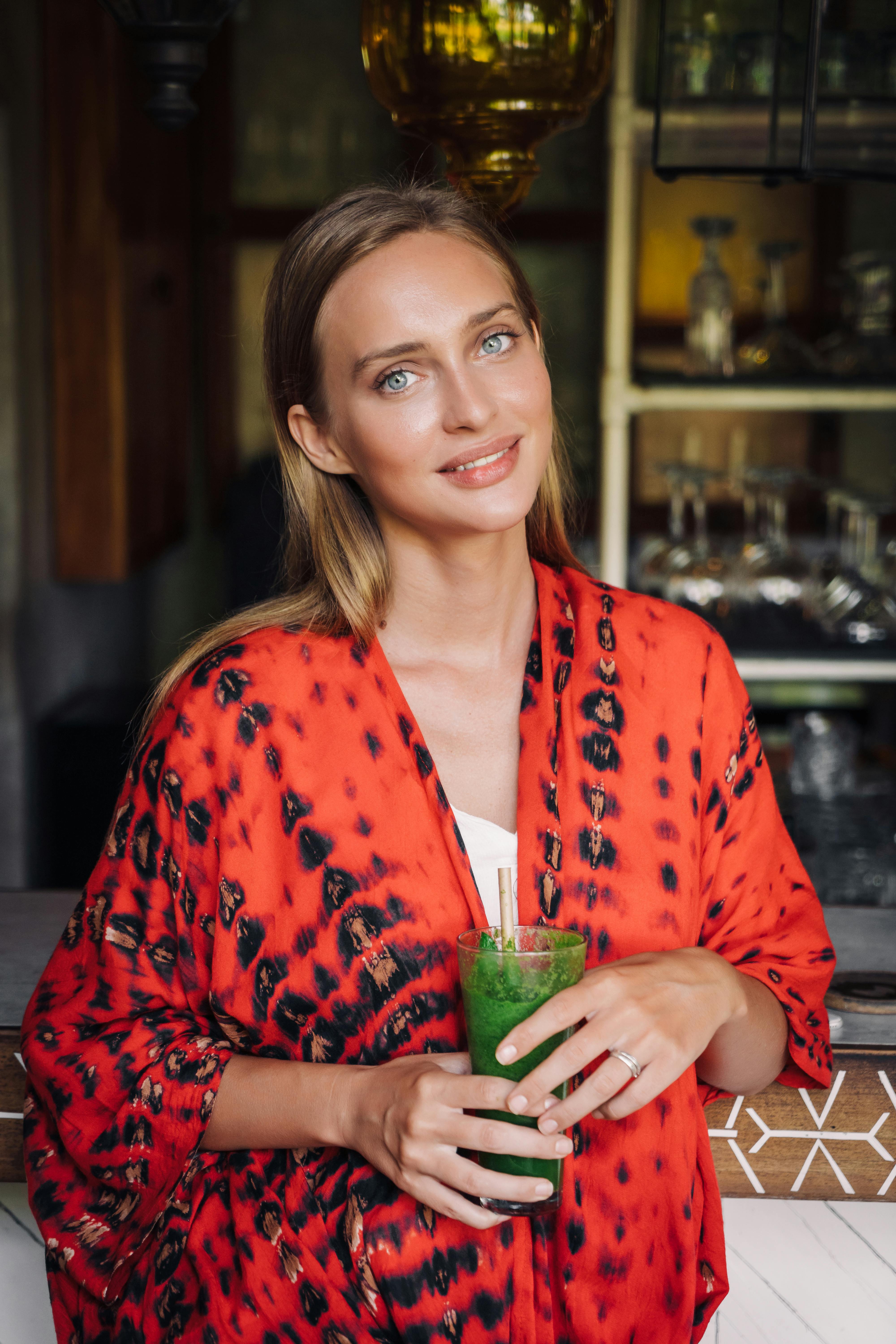 Woman Wearing a Red Cover Up · Free Stock Photo