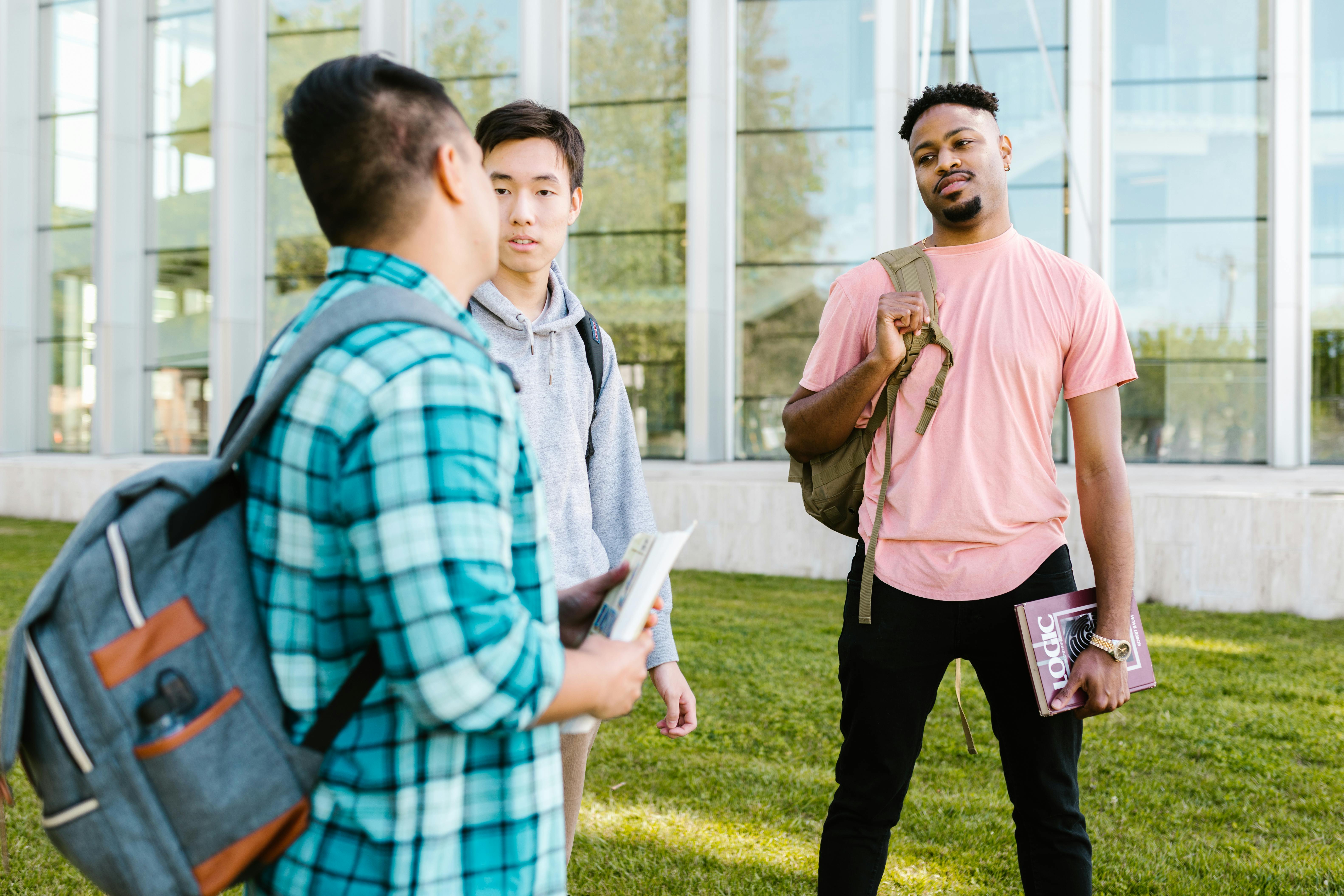 Group Men Standing on Grass · Free Stock Photo