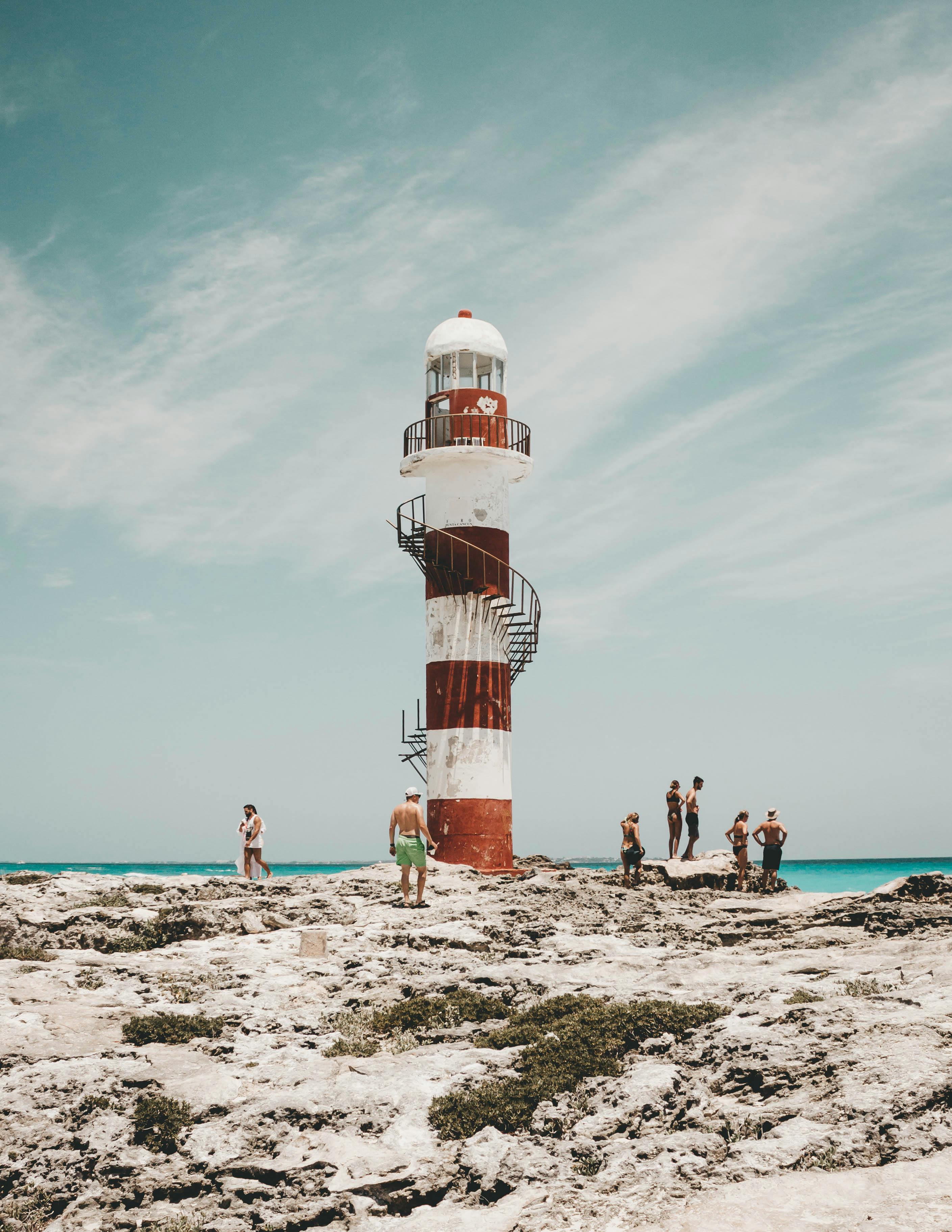 Beach with Lighthouse · Free Stock Photo