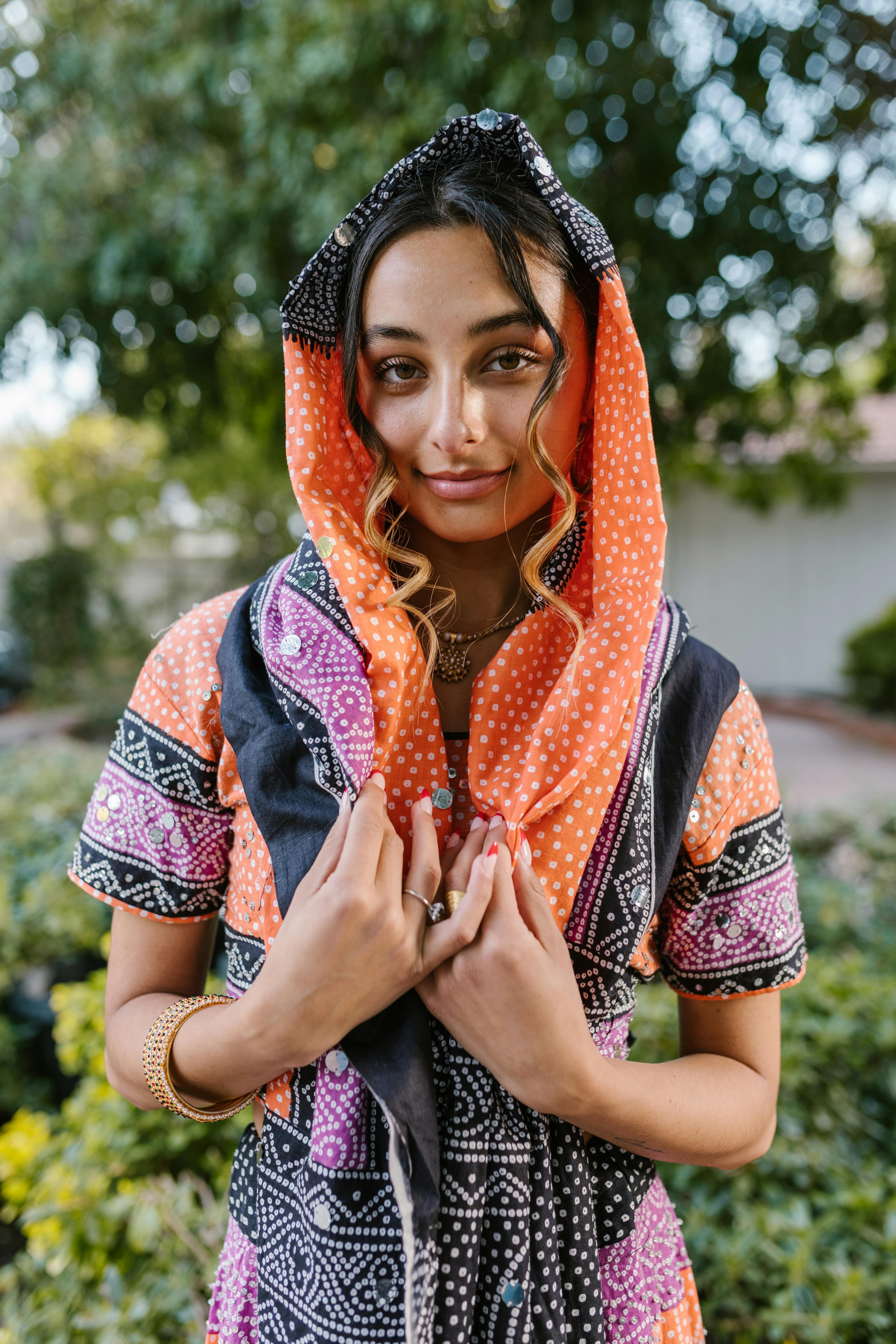 Woman in Traditional Dress Posing · Free Stock Photo