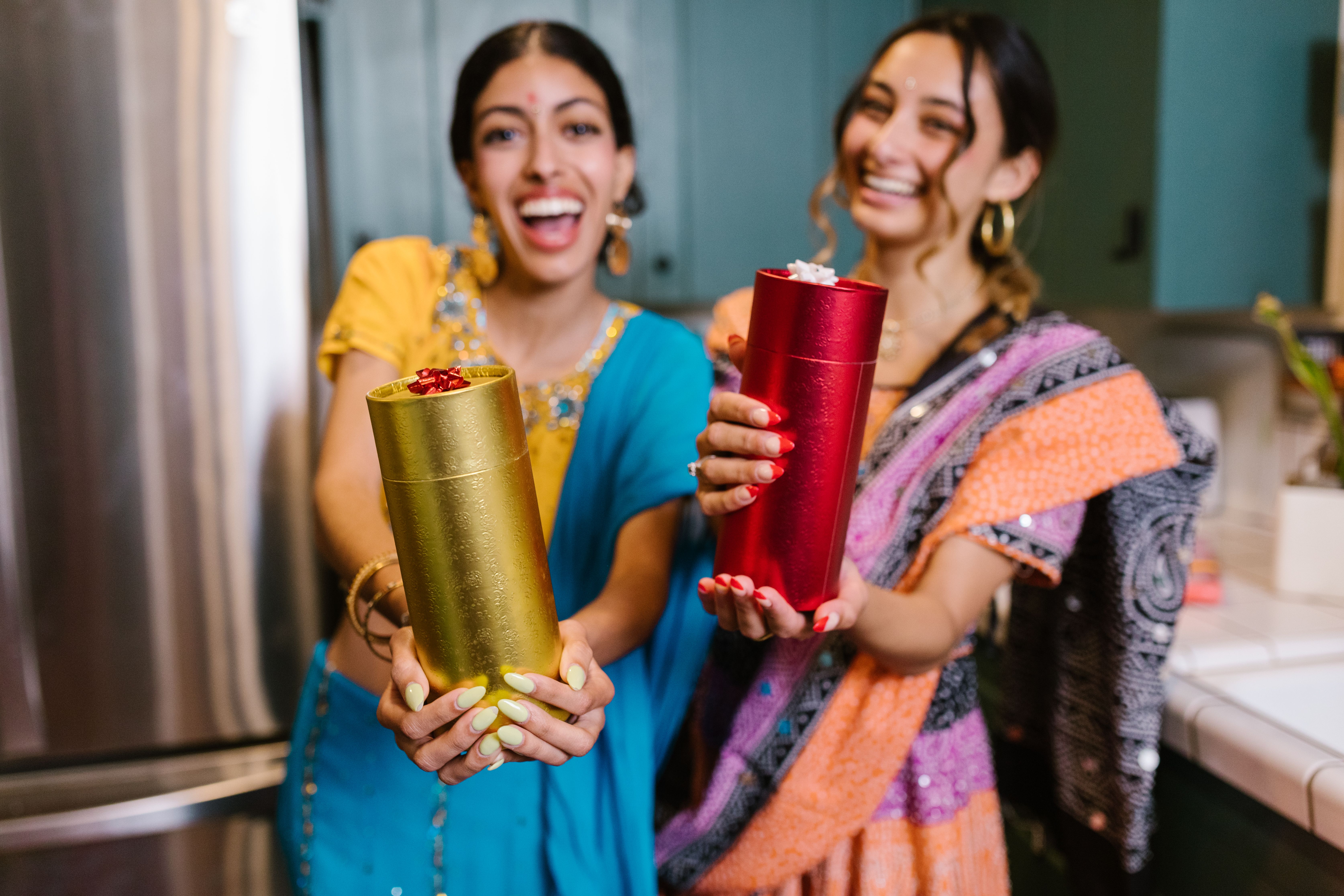 Women Wearing Saree Holding Gifts · Free Stock Photo