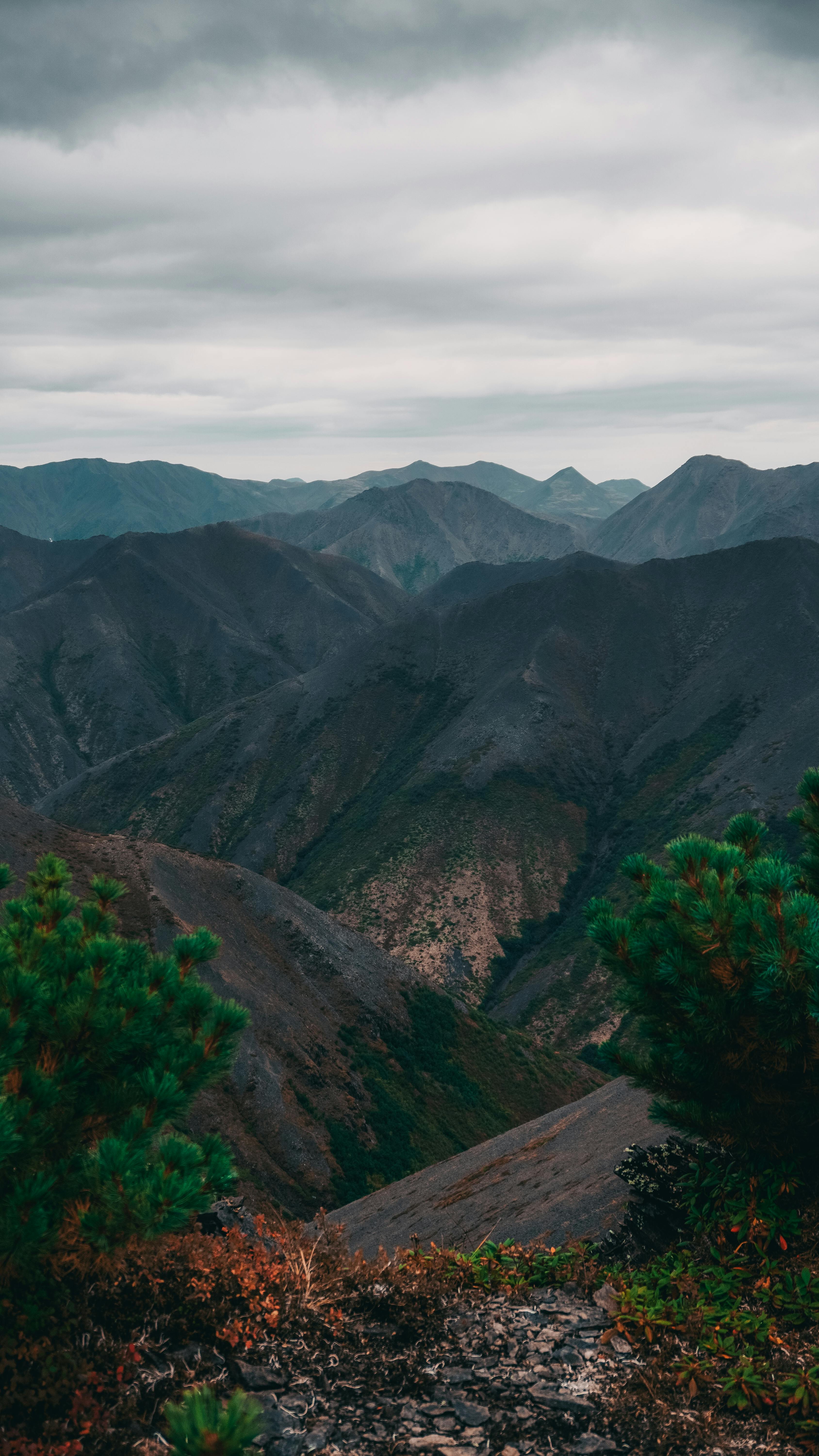 Mountains under Cloudy Sky · Free Stock Photo