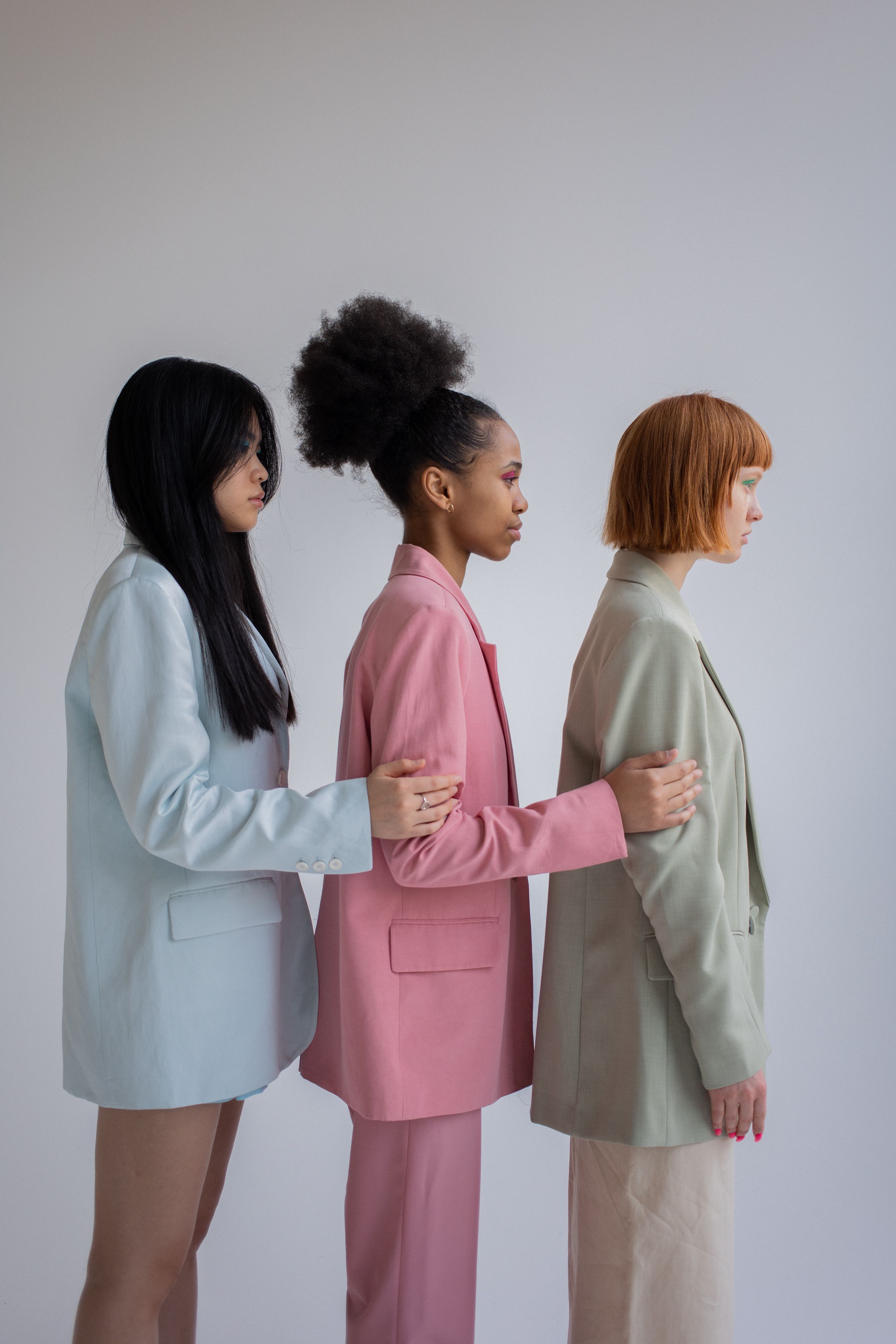 Multiracial women in elegant formal outfits · Free Stock Photo