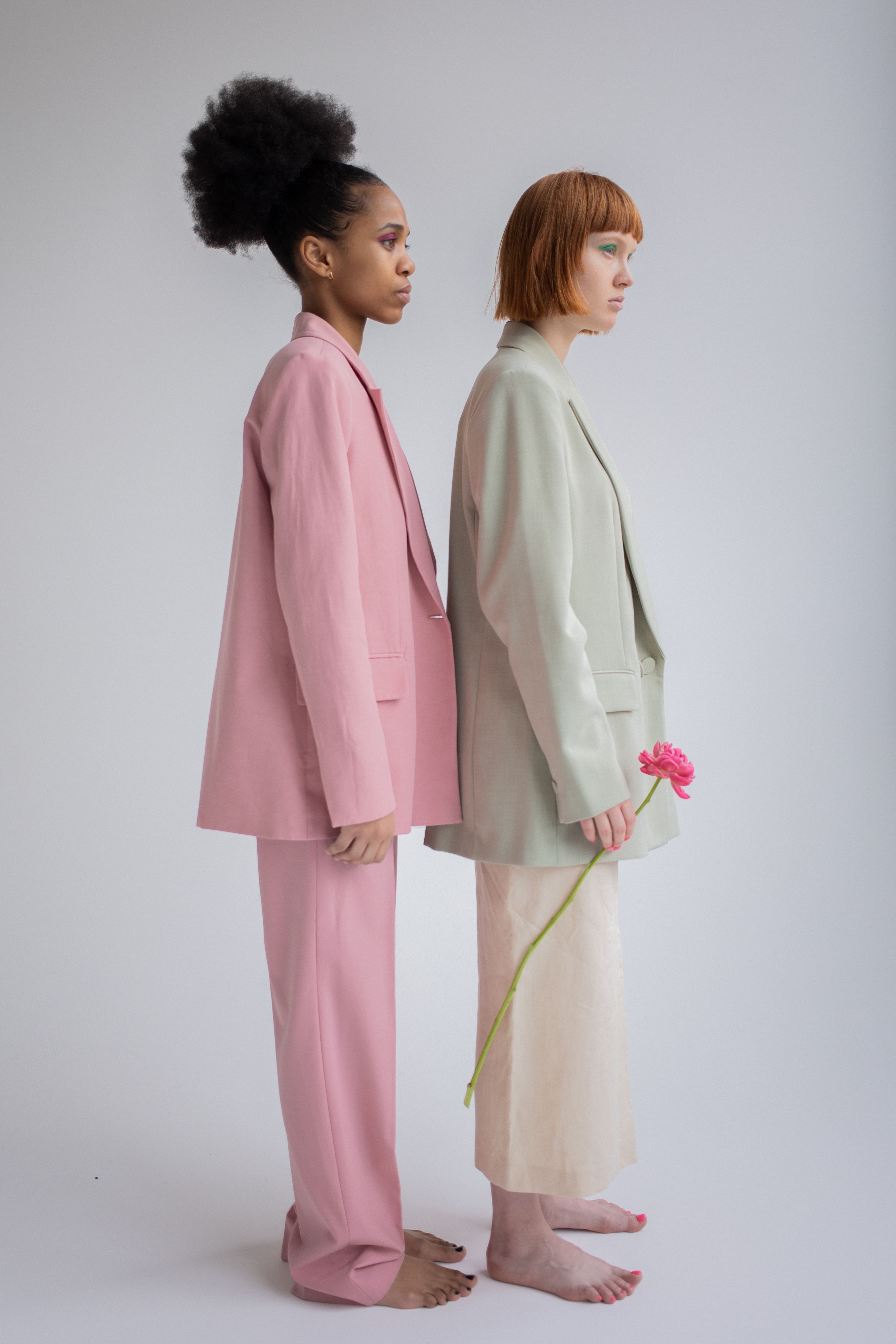 Multiracial models in trendy clothes in studio · Free Stock Photo