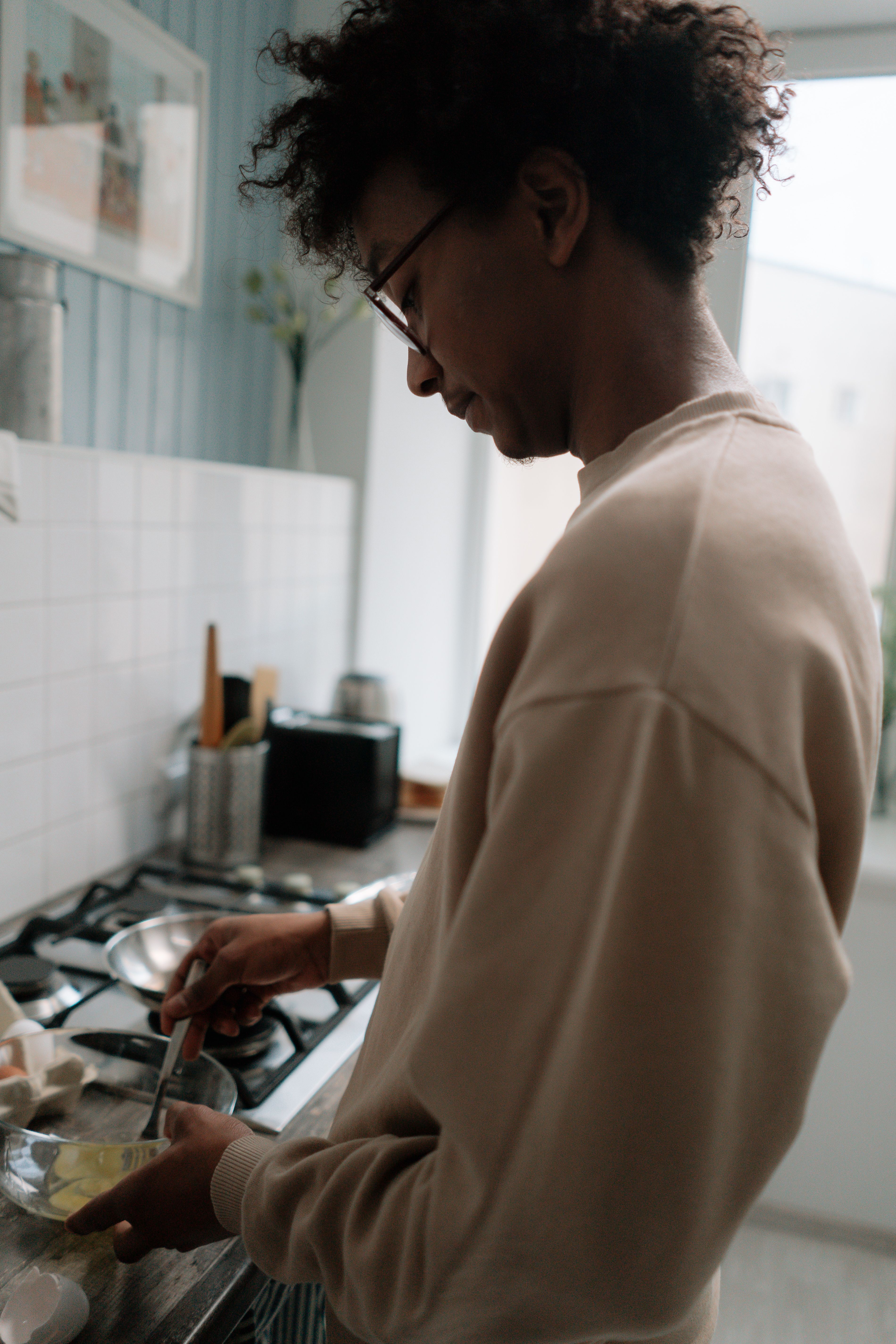 A Person Cooking in the Kitchen · Free Stock Photo