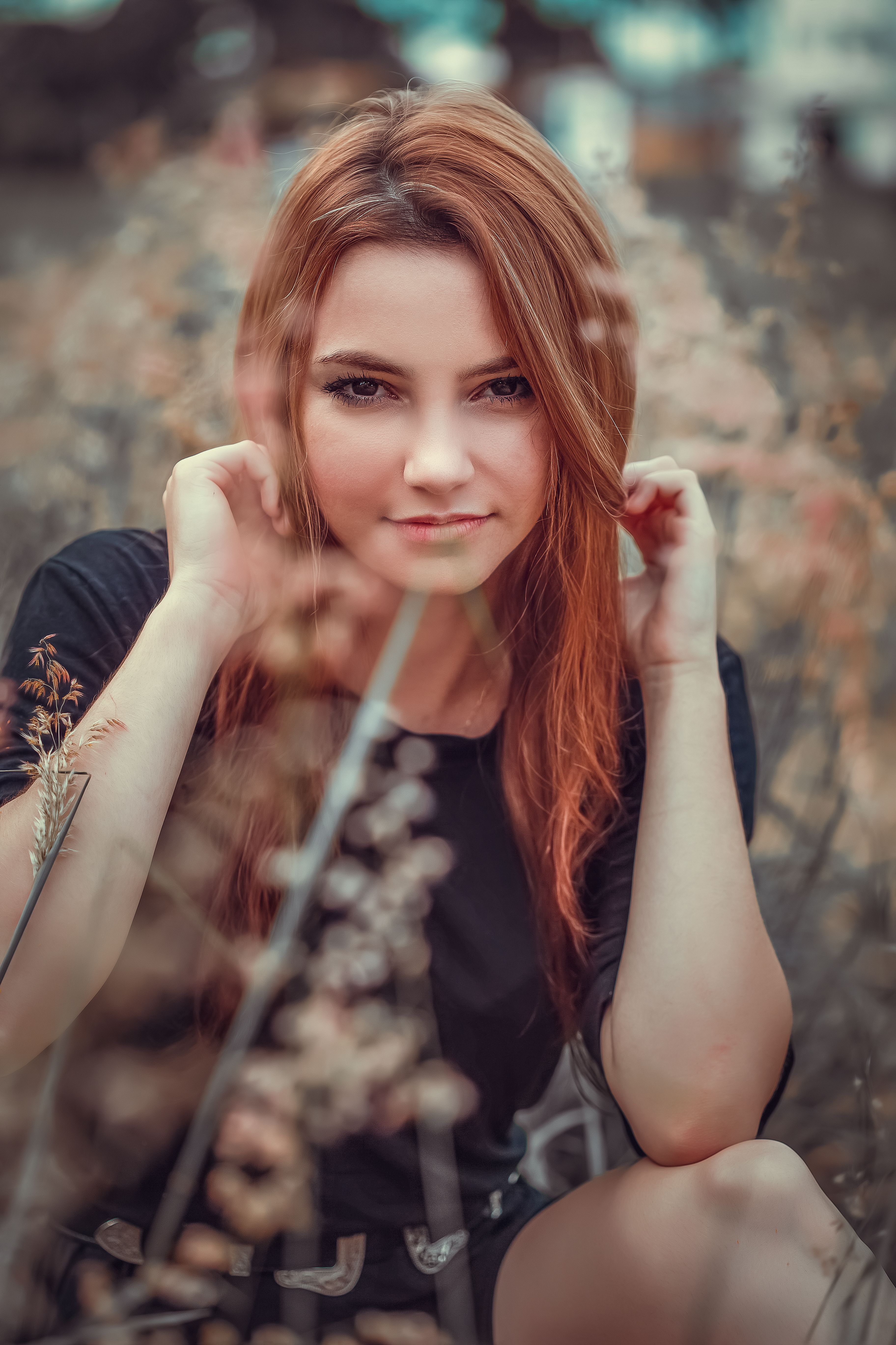 Smiling Woman Sitting with Balloons · Free Stock Photo
