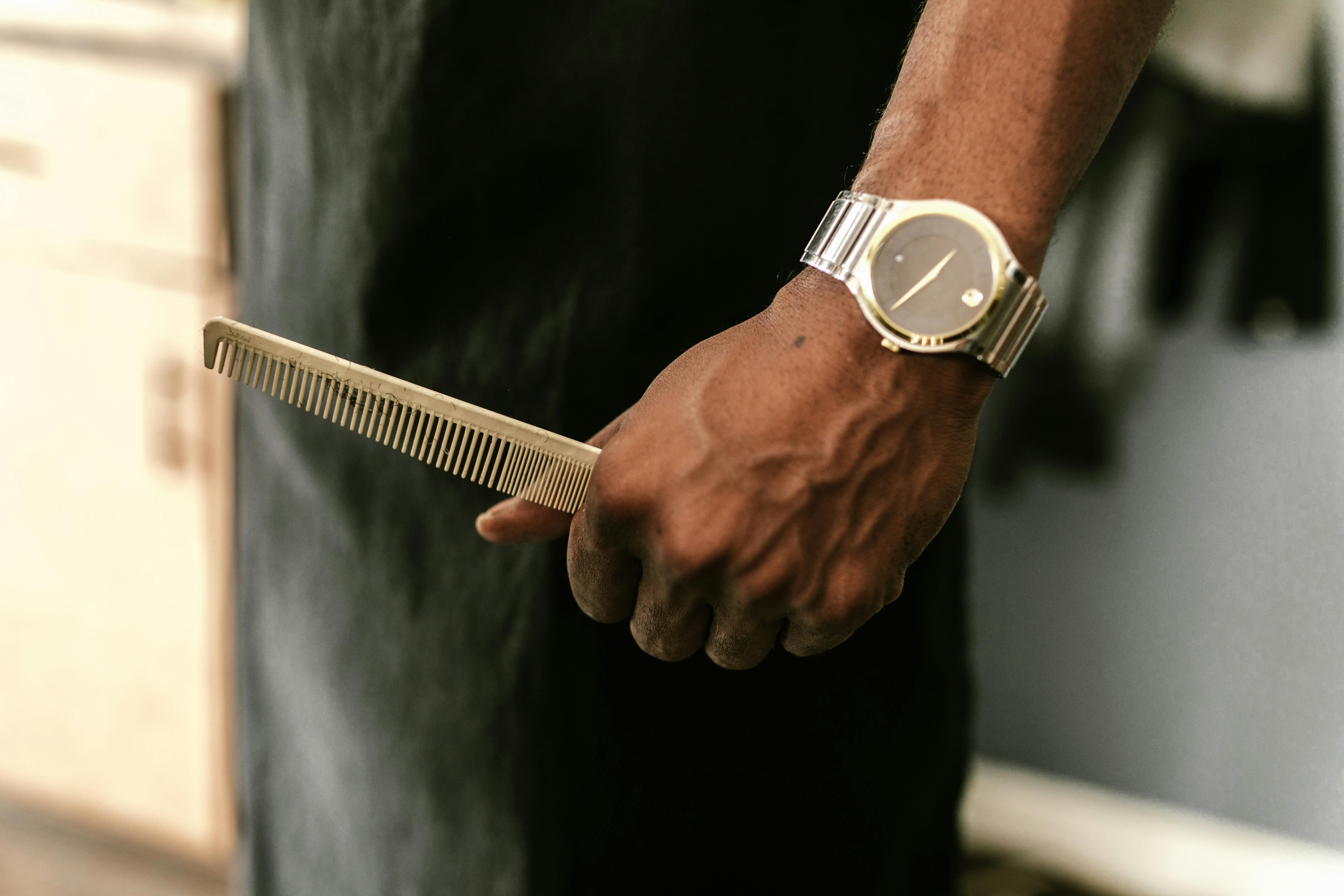 Close-Up View of a Person Putting Talc in His Hands · Free Stock Photo