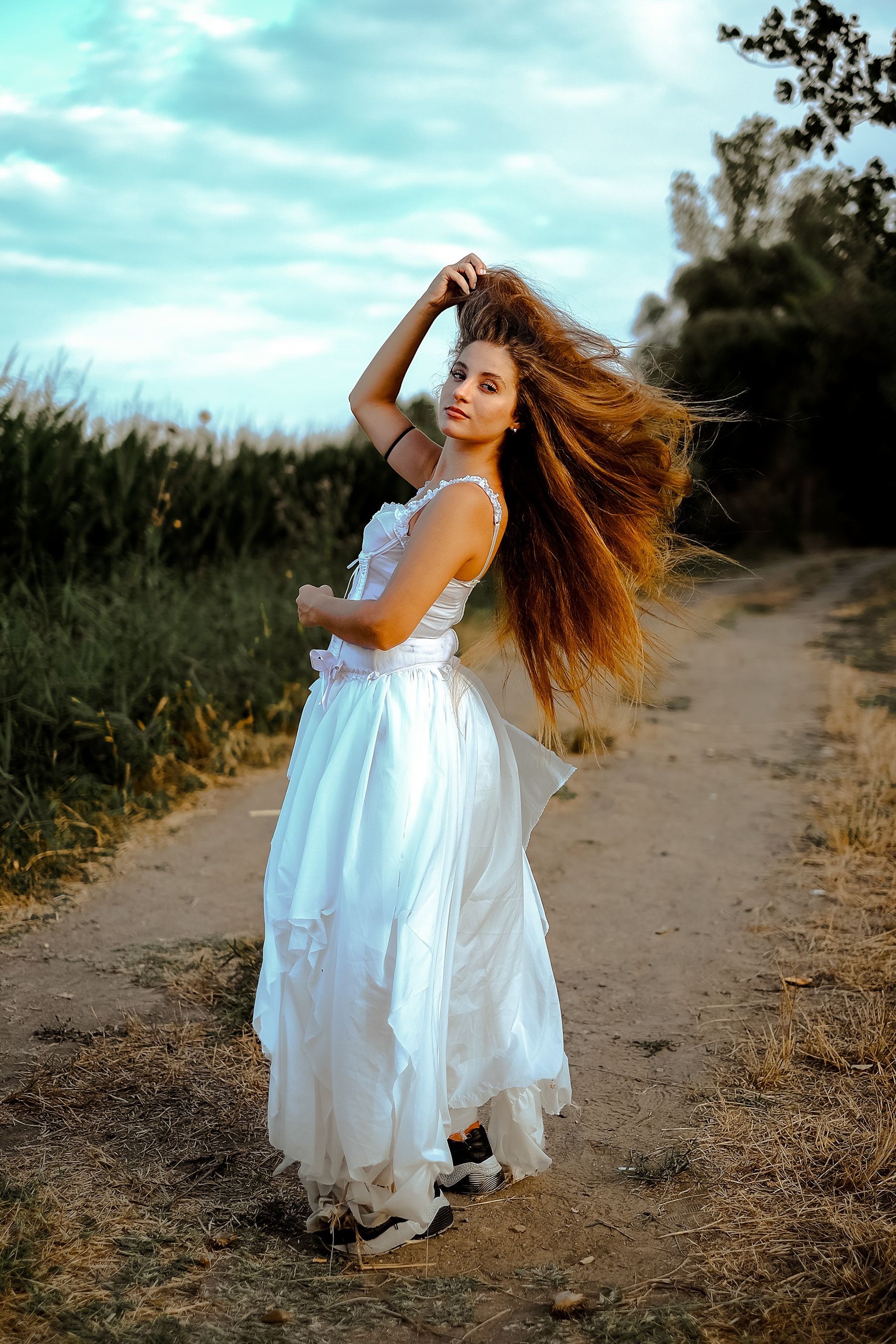 Woman in Floral Dress Spinning Around · Free Stock Photo