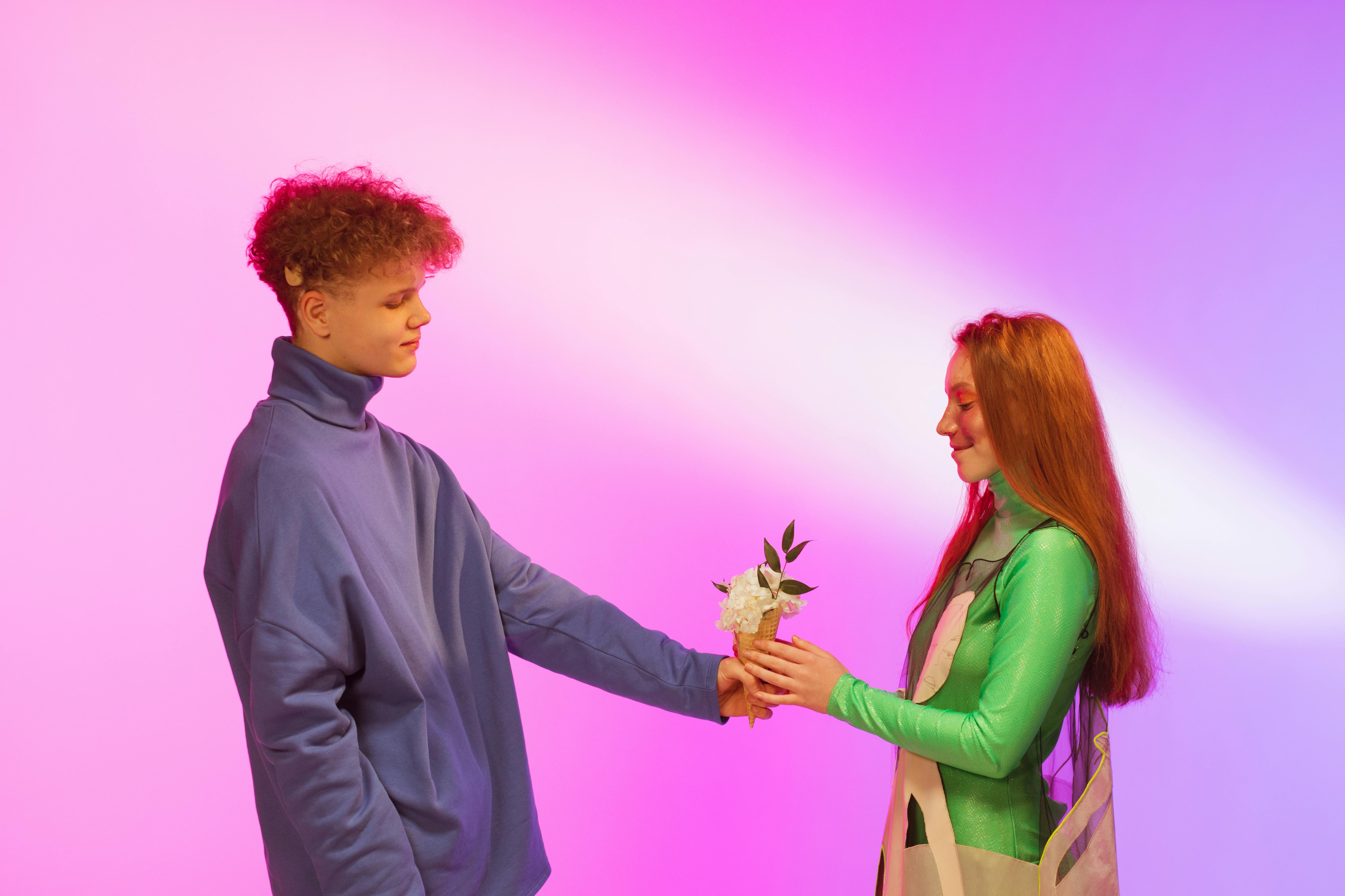 A Person Handing Out a Key · Free Stock Photo