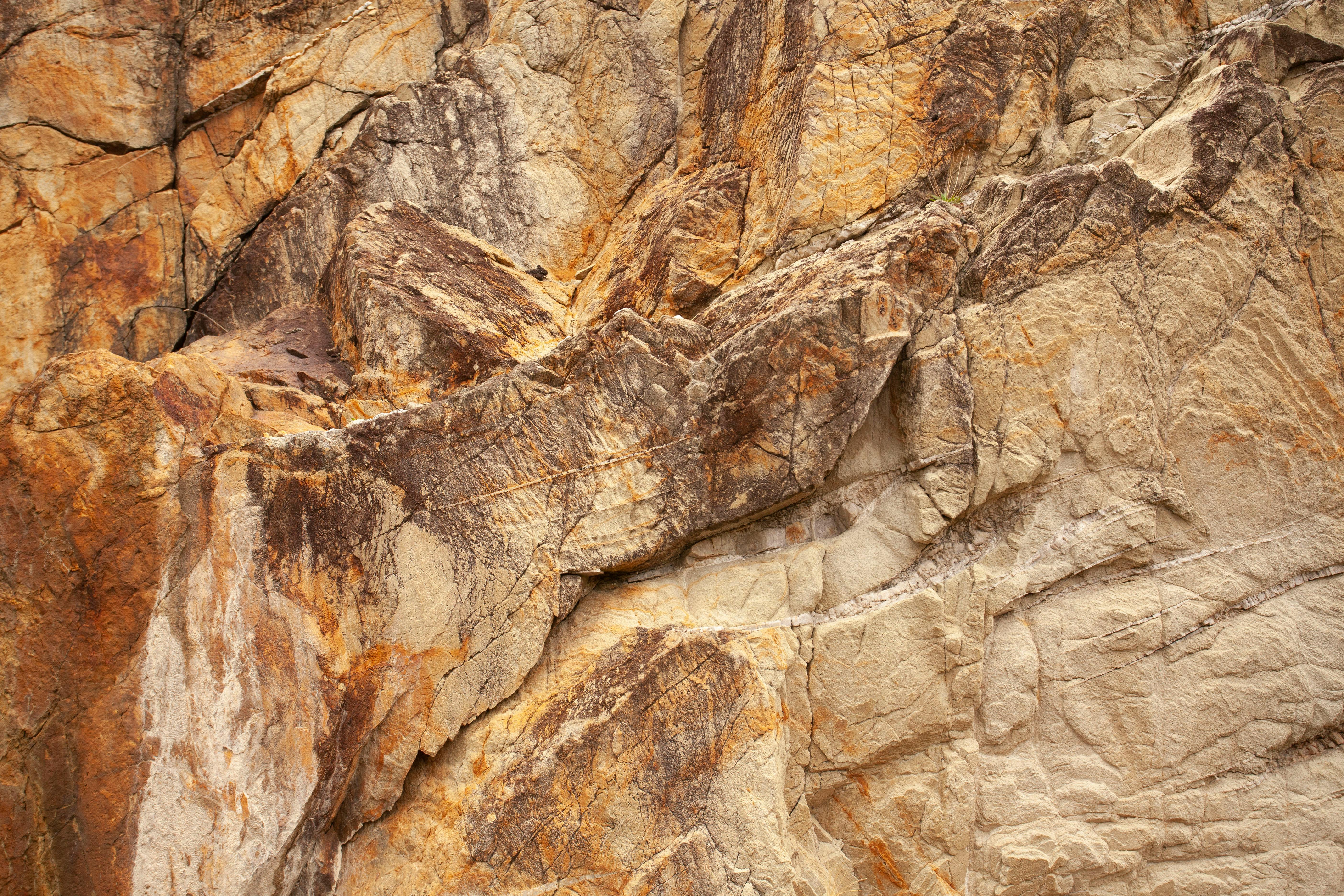 Close Up Shot Of Brown Rock Formation · Free Stock Photo