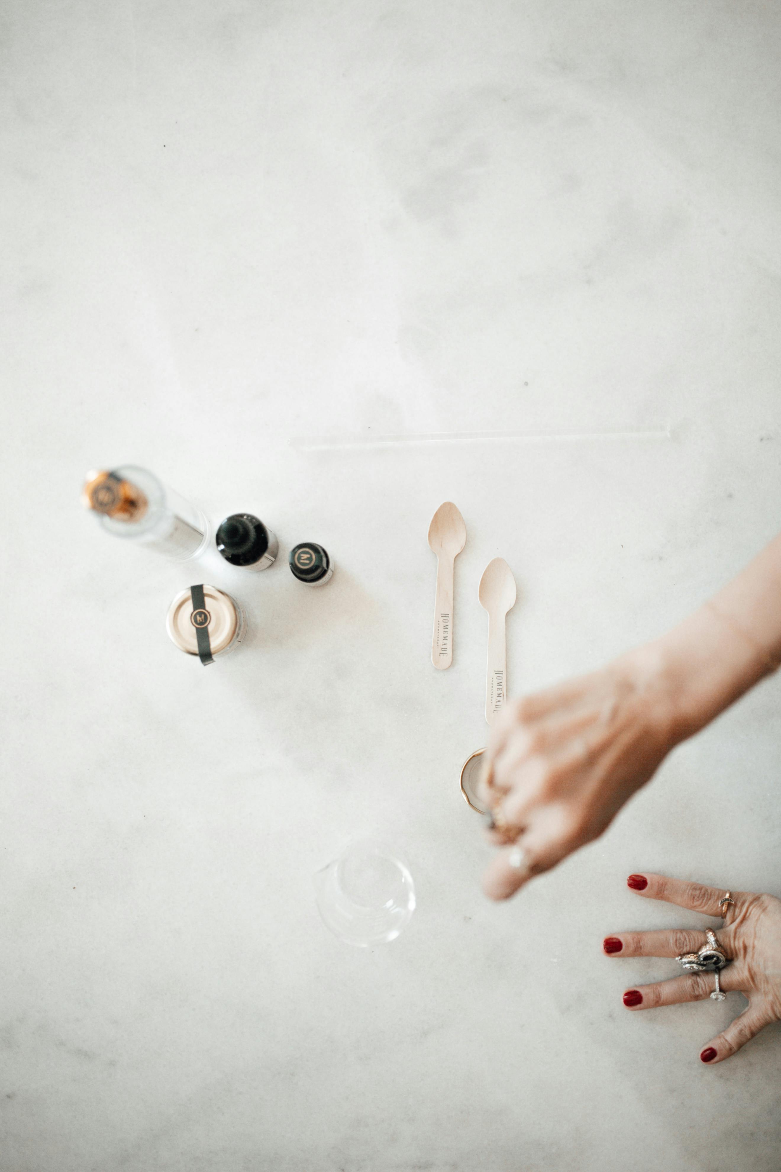 Woman Hands over Spoons · Free Stock Photo